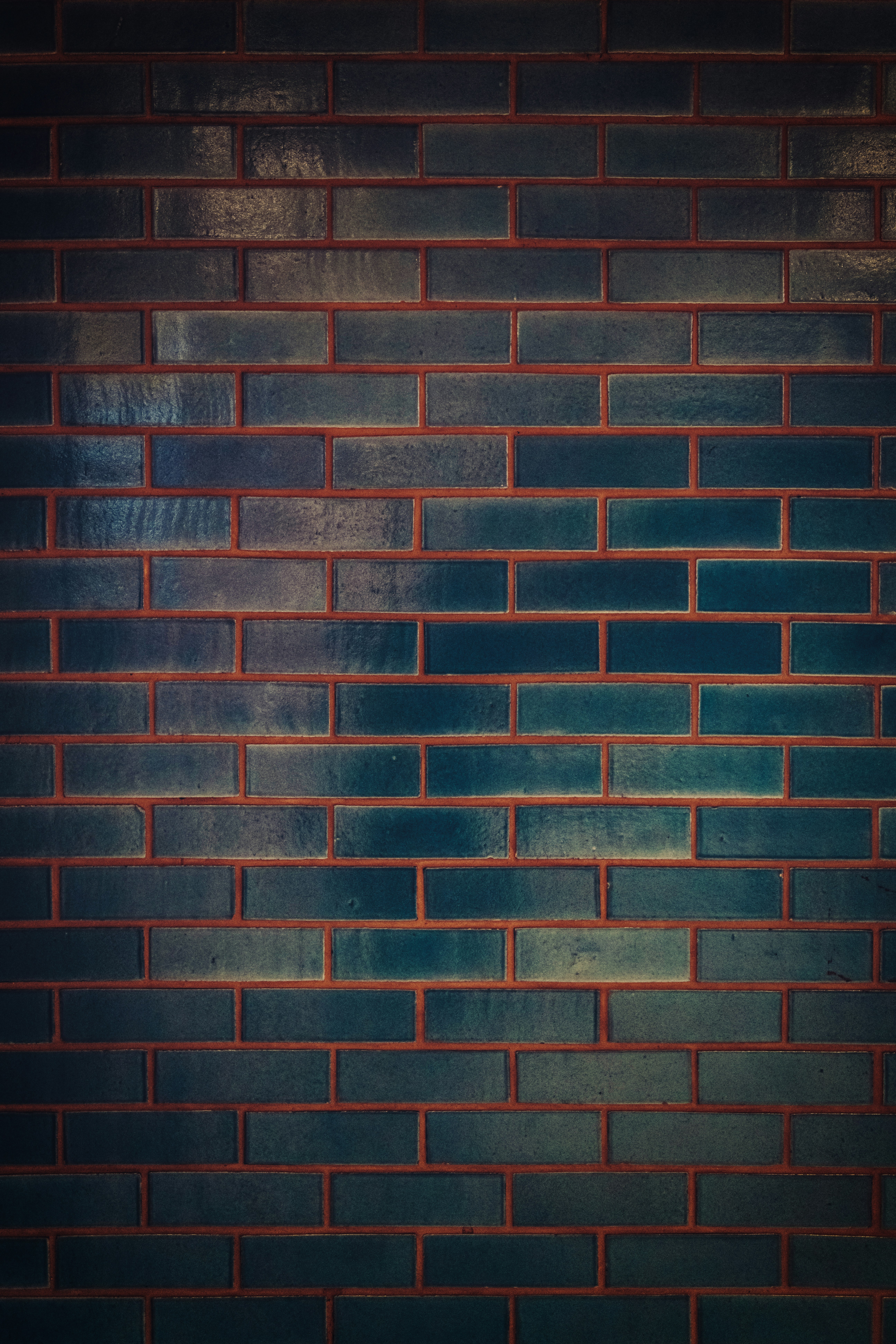 Blue Bricks | Instagram: @timmossholder | brown and black brick wall