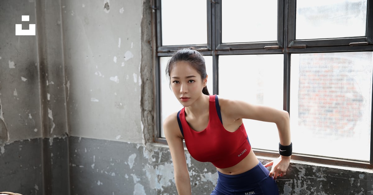 Woman In Red Tank Top And Blue Denim Jeans Photo Free Portrait Image