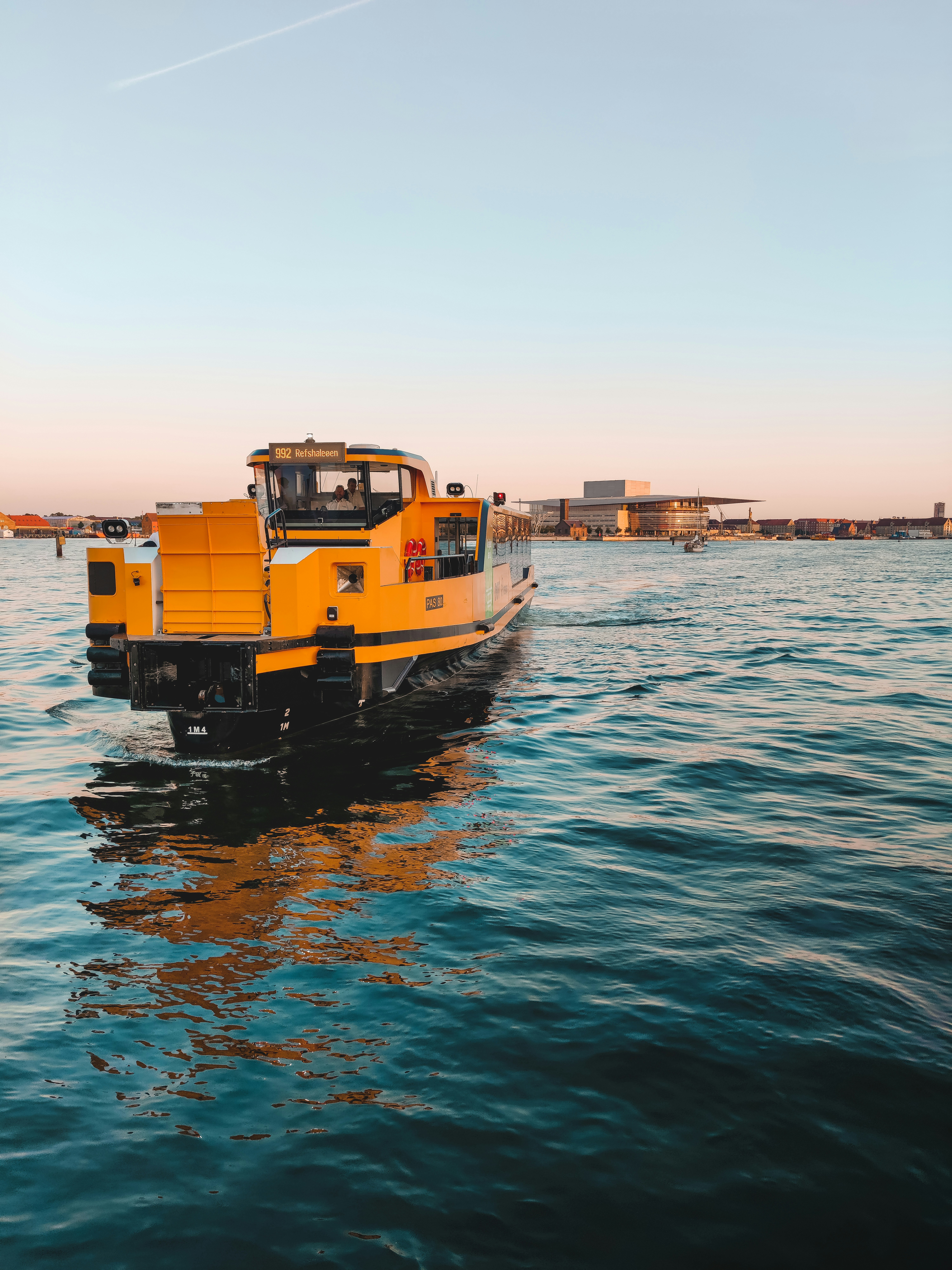 Harbor Yellow Workboat at Dusk Over Glassy Waters