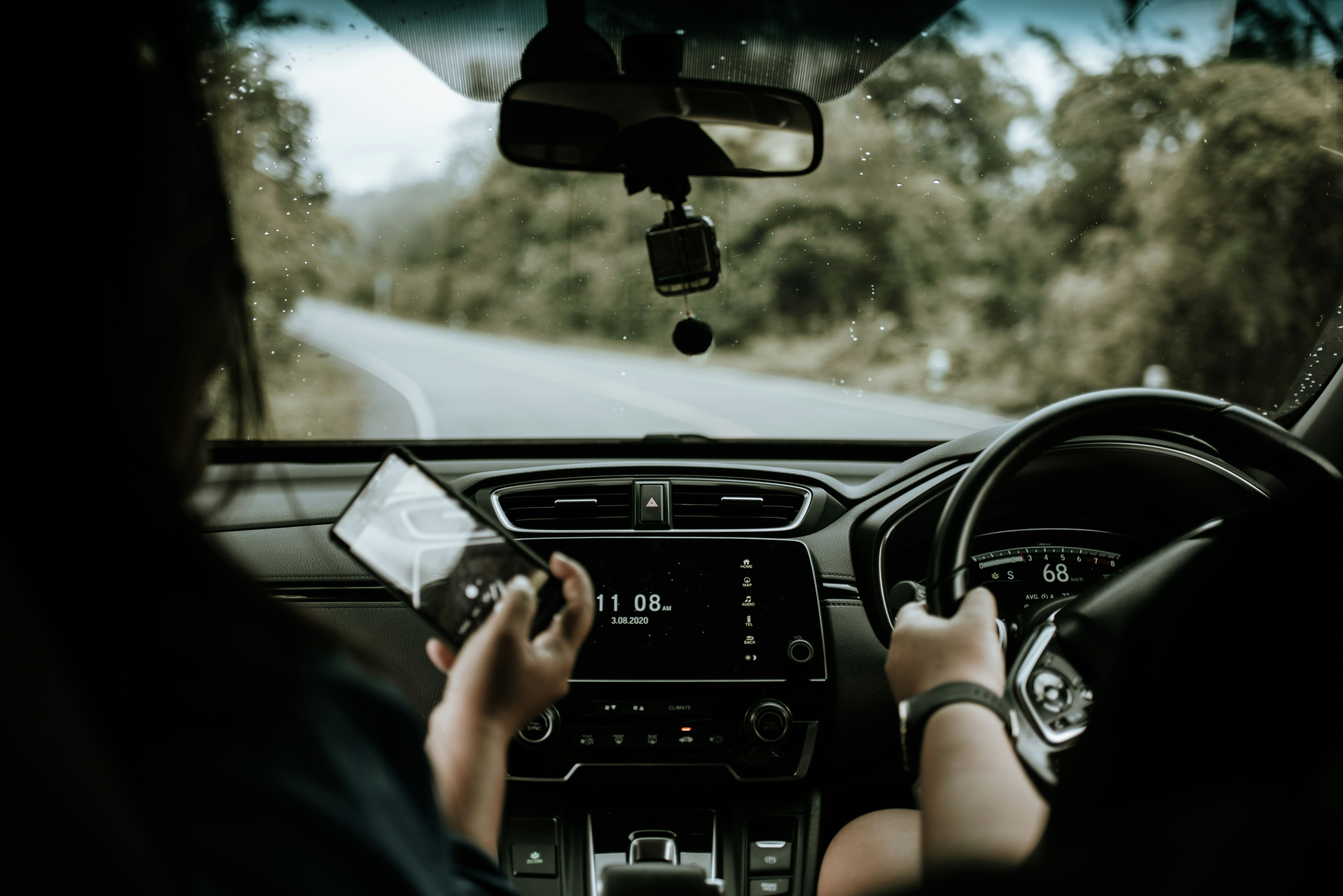 Person driving car during daytime photo – Free Nan Image on Unsplash