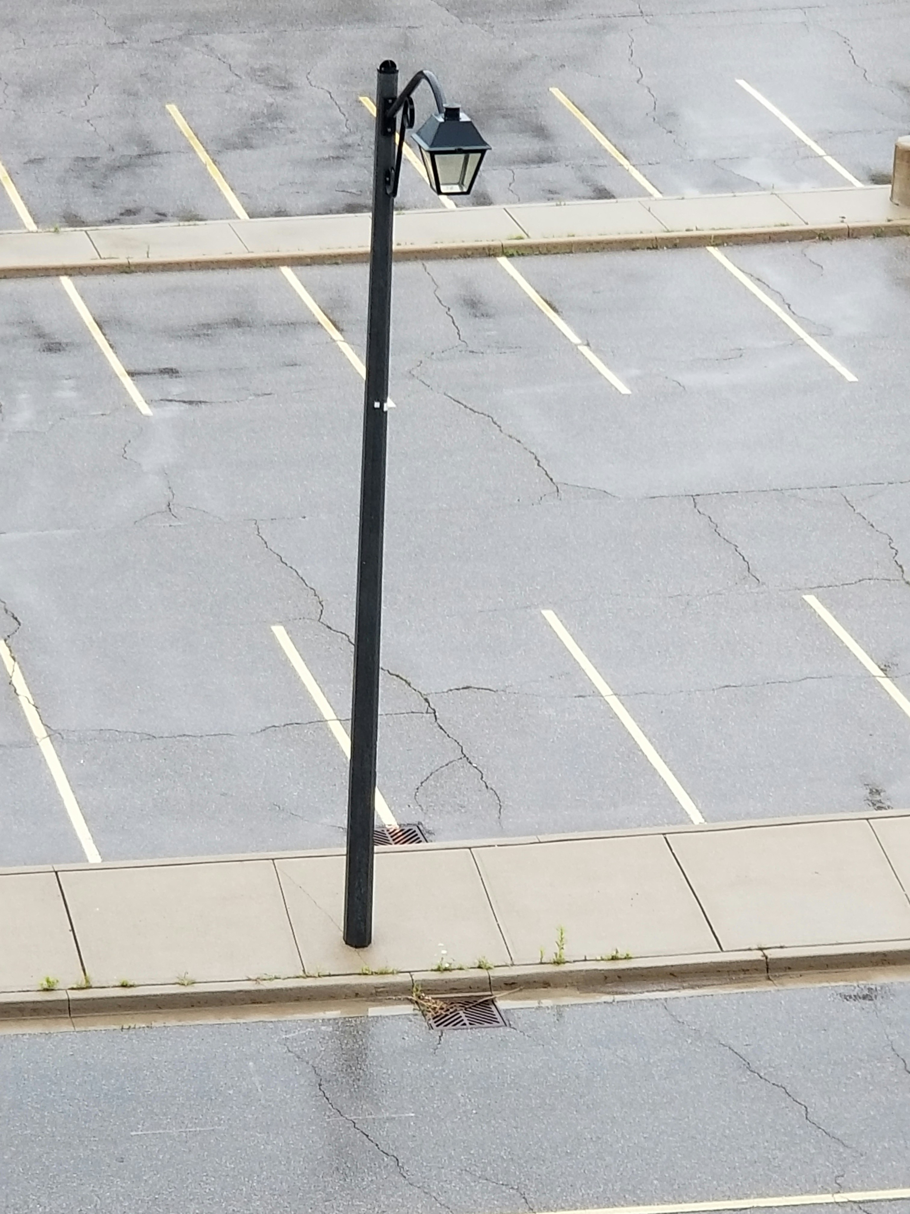 Black metal pole on white and blue floor tiles photo – Free Grey Image ...