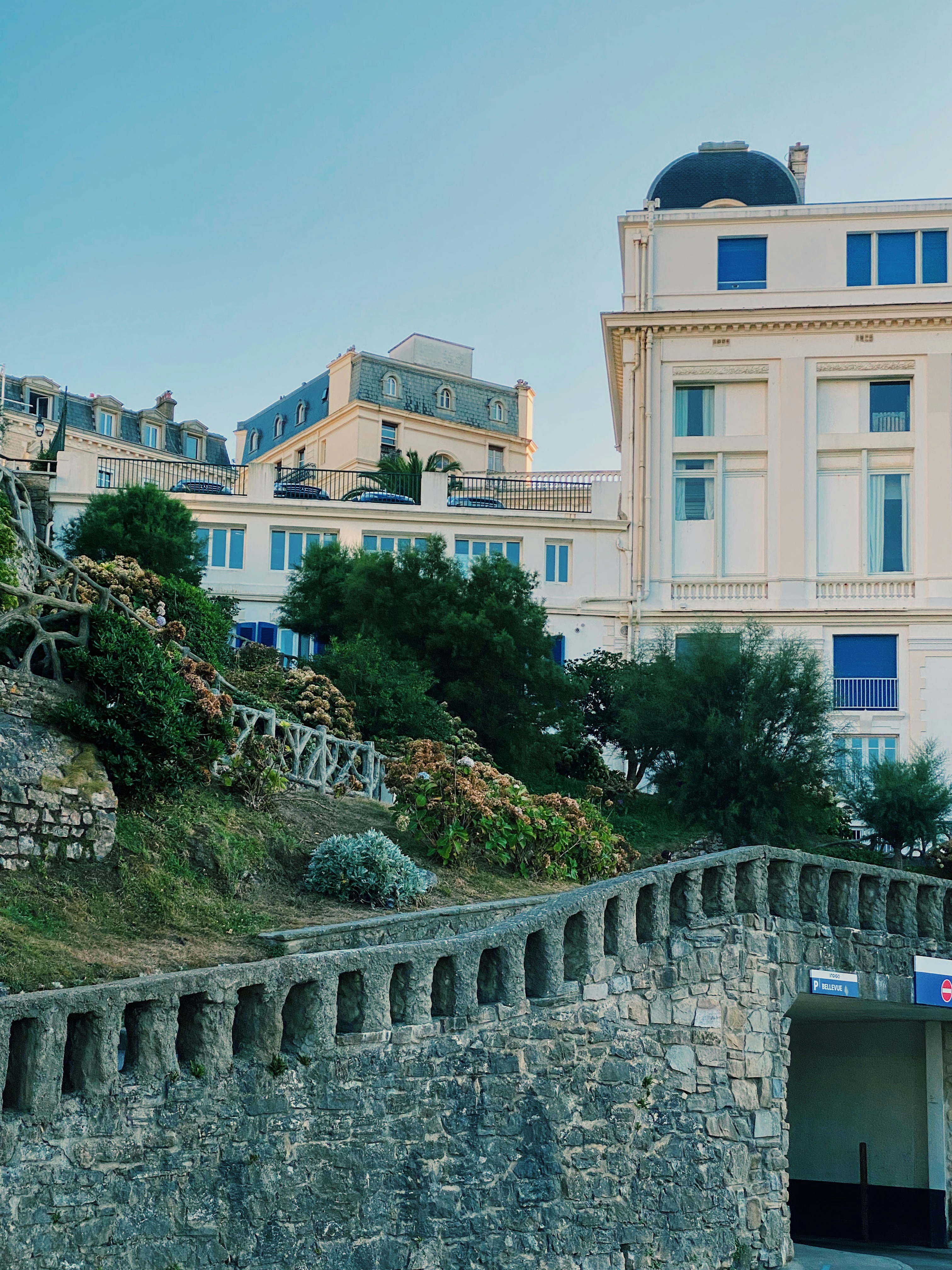 Terraced Arches and a Neoclassical Manor Framed by a Cerulean Sky