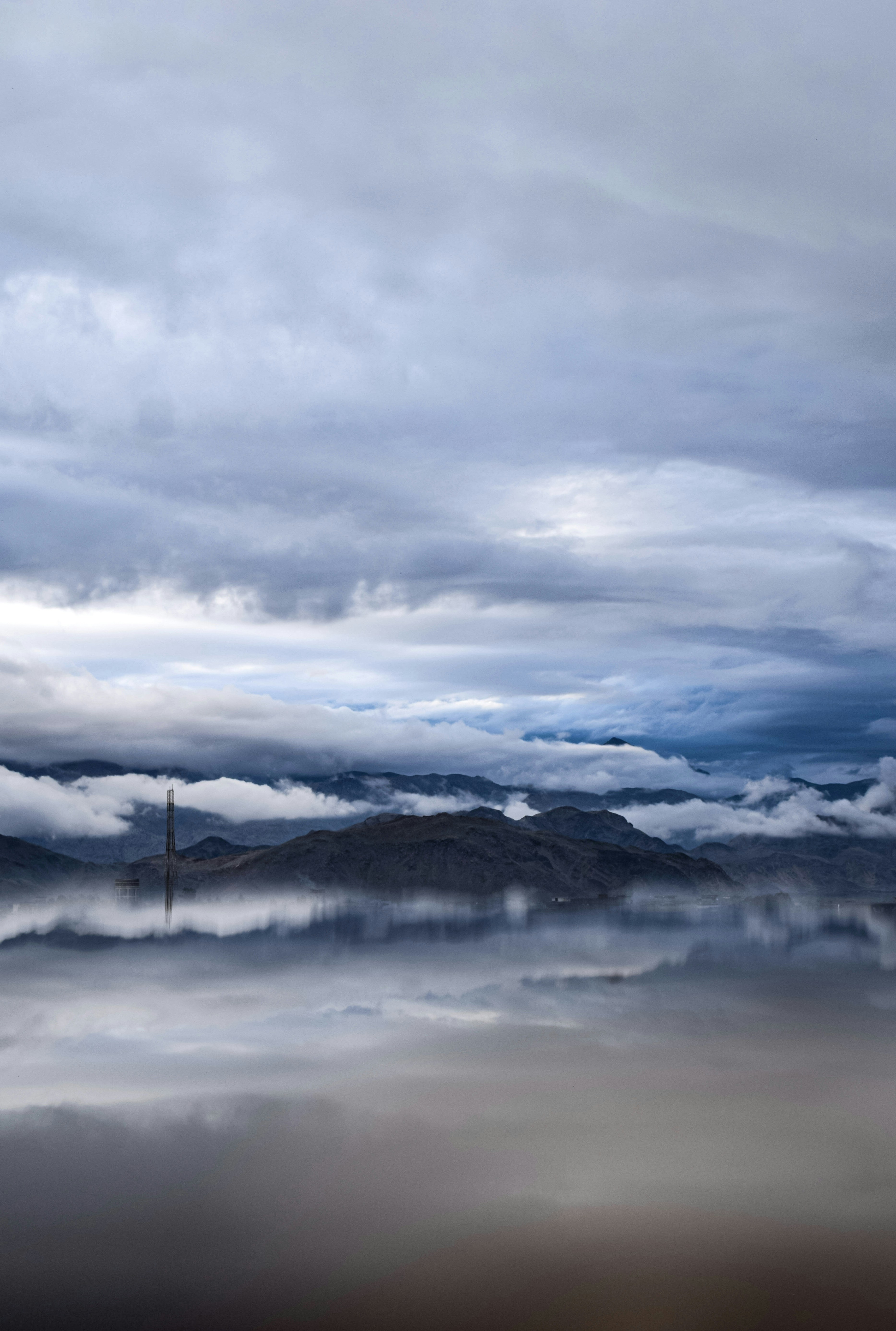 Snow covered mountains under cloudy sky during daytime photo – Free ...