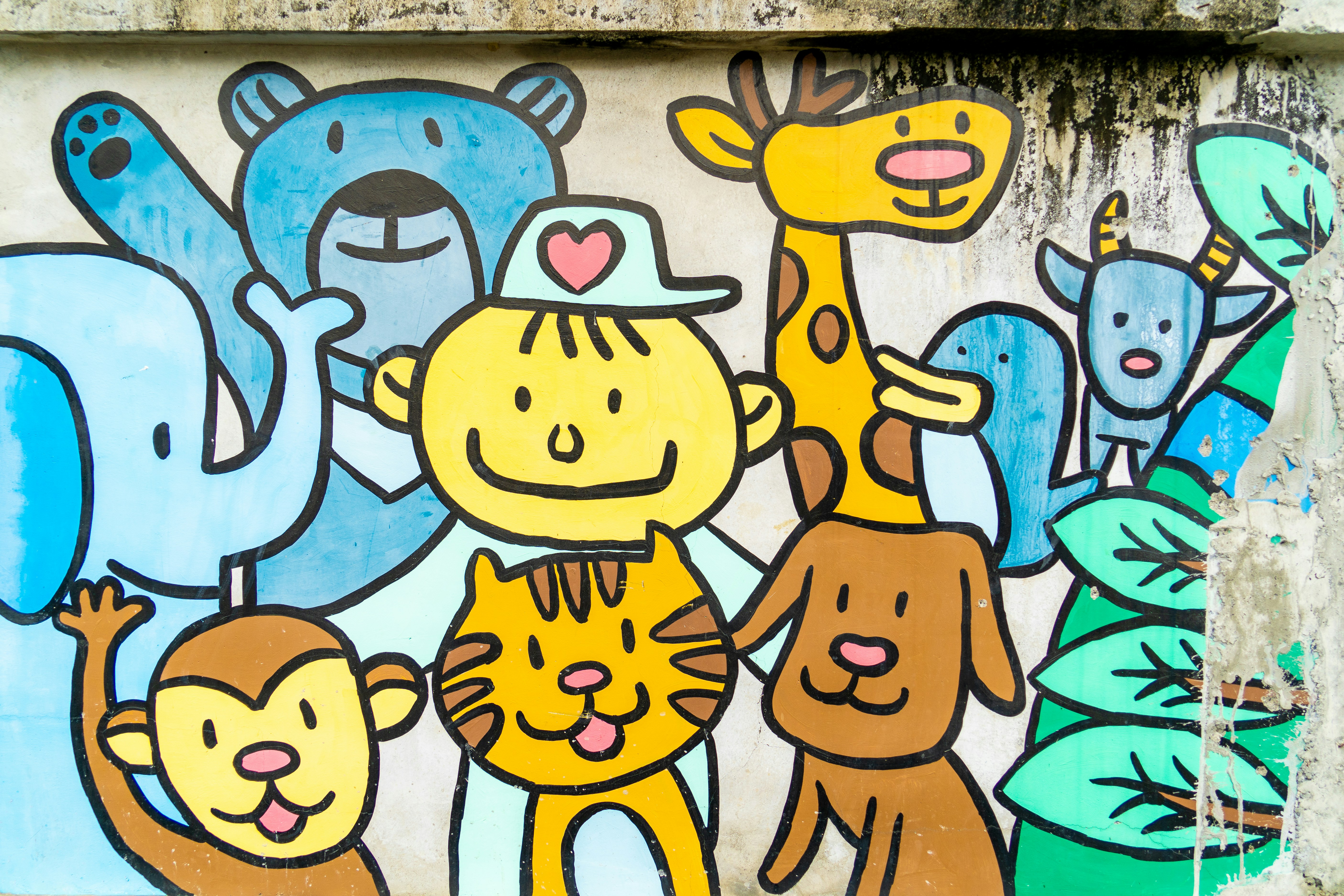 Yellow Hat Among Colorful Pals: A Graffiti Portrait
