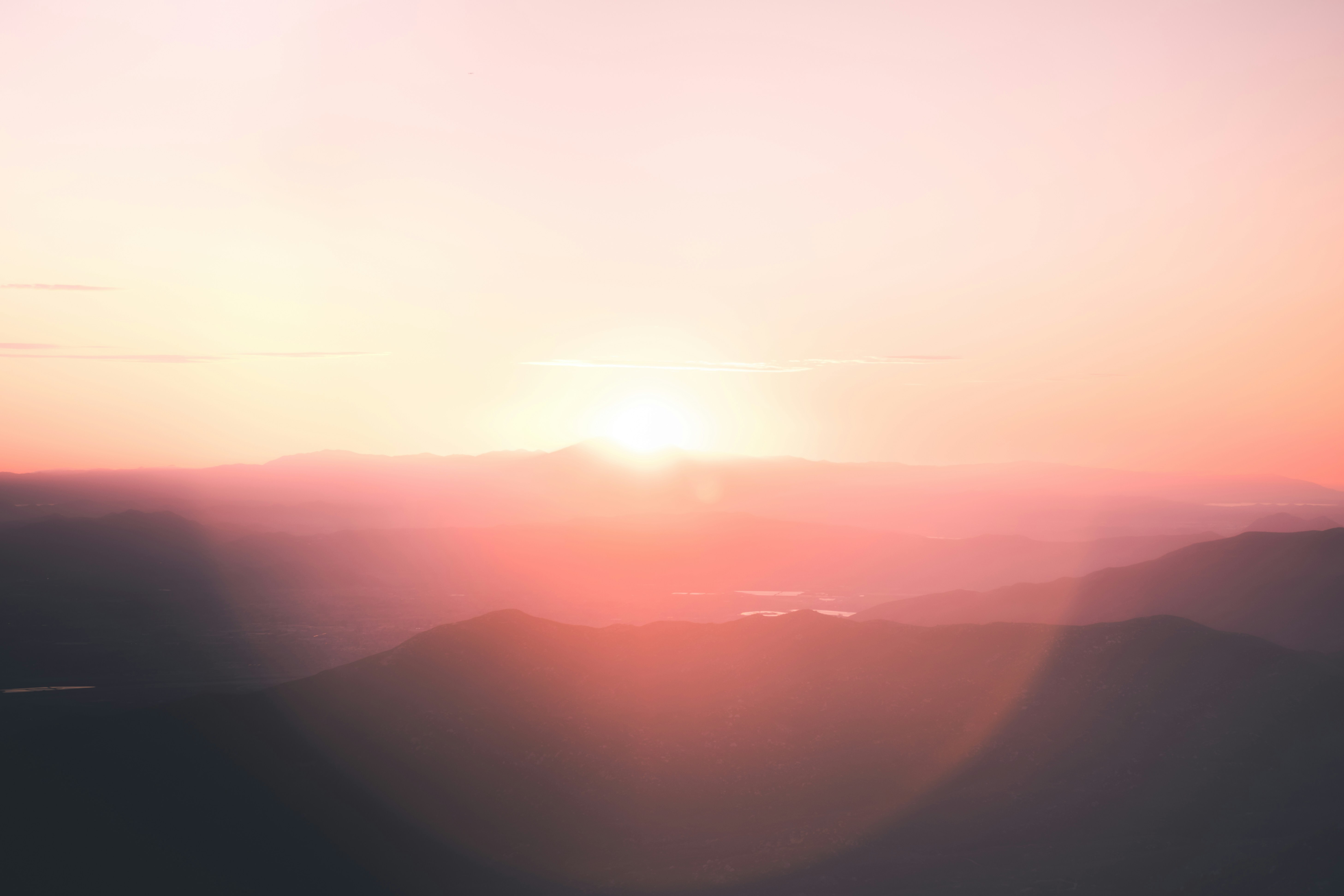 Dawn's Embrace Over the HorizonLeonardo Yip