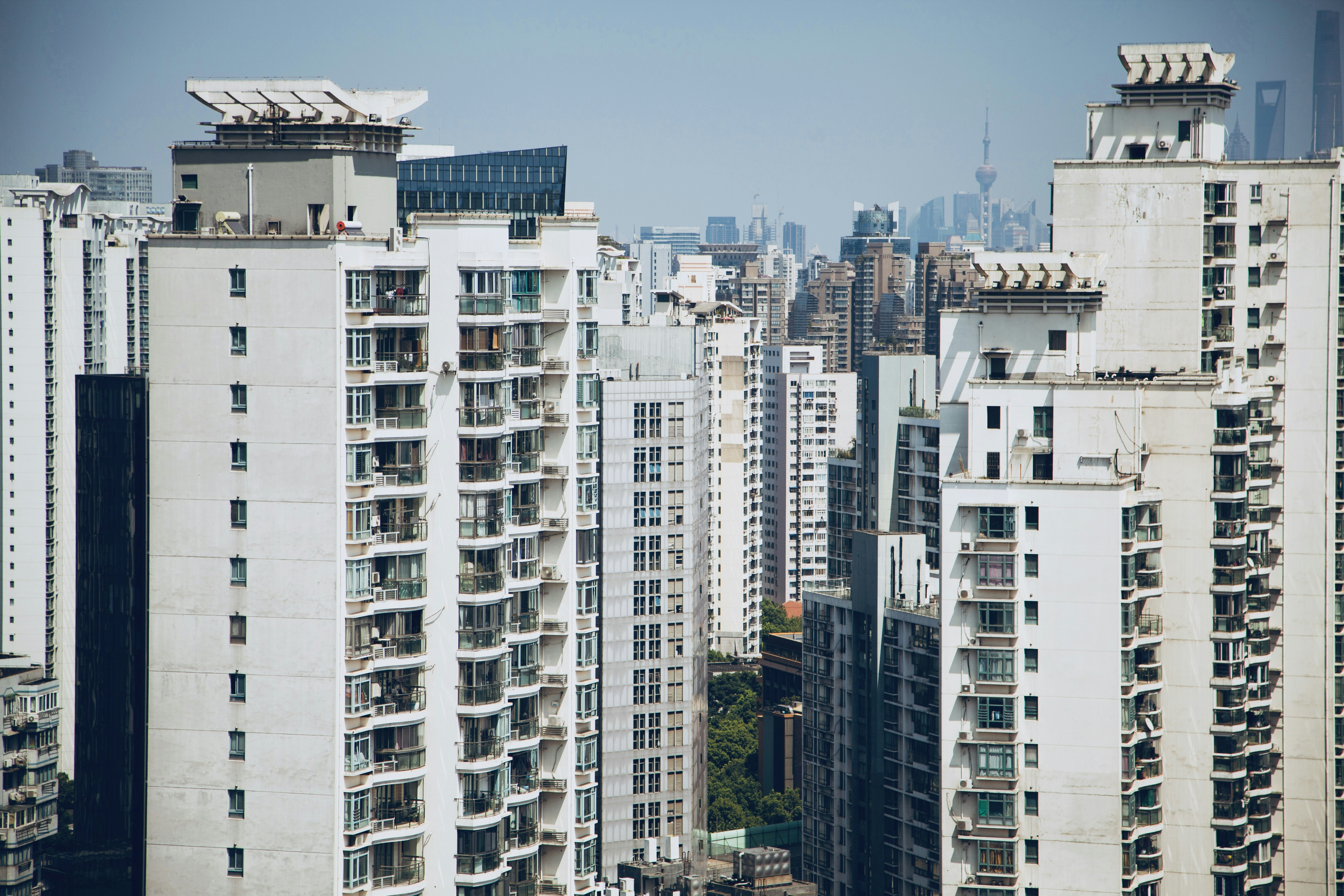 White concrete high rise building during daytime photo – Free 上海市 Image ...