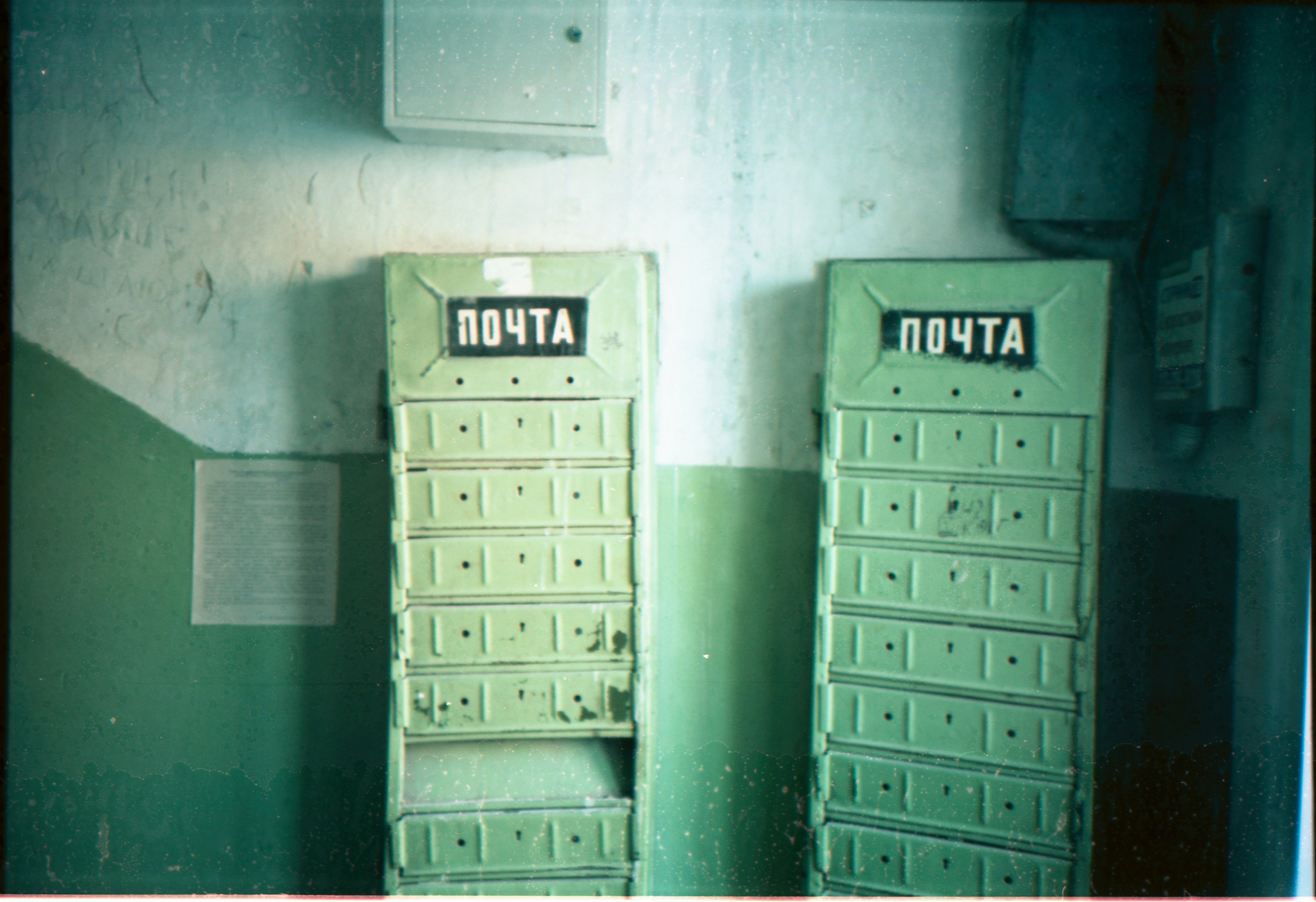 Green steel locker on white wall photo – Free Film Image on Unsplash