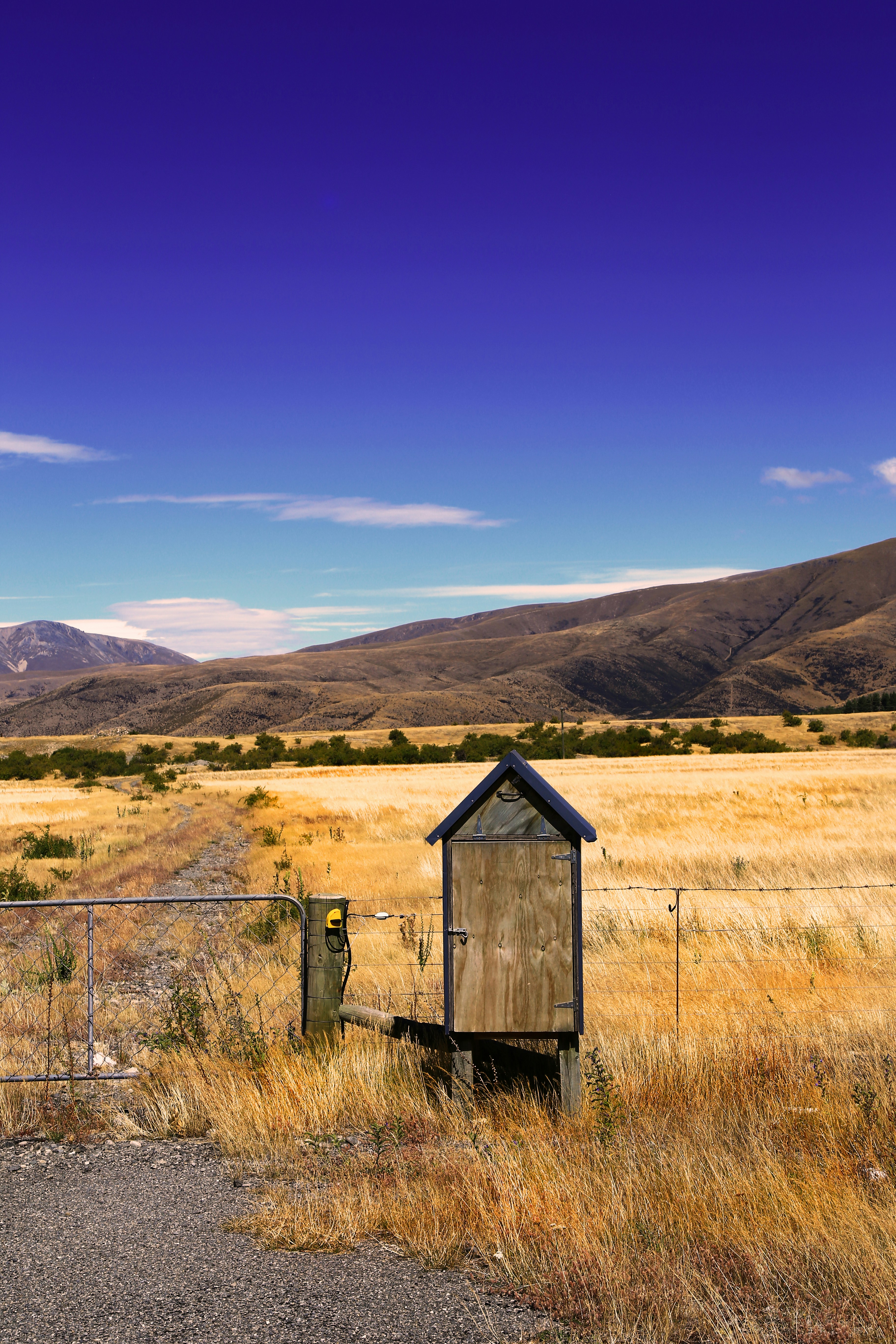 Rustic Mailbox Under Vast Skies