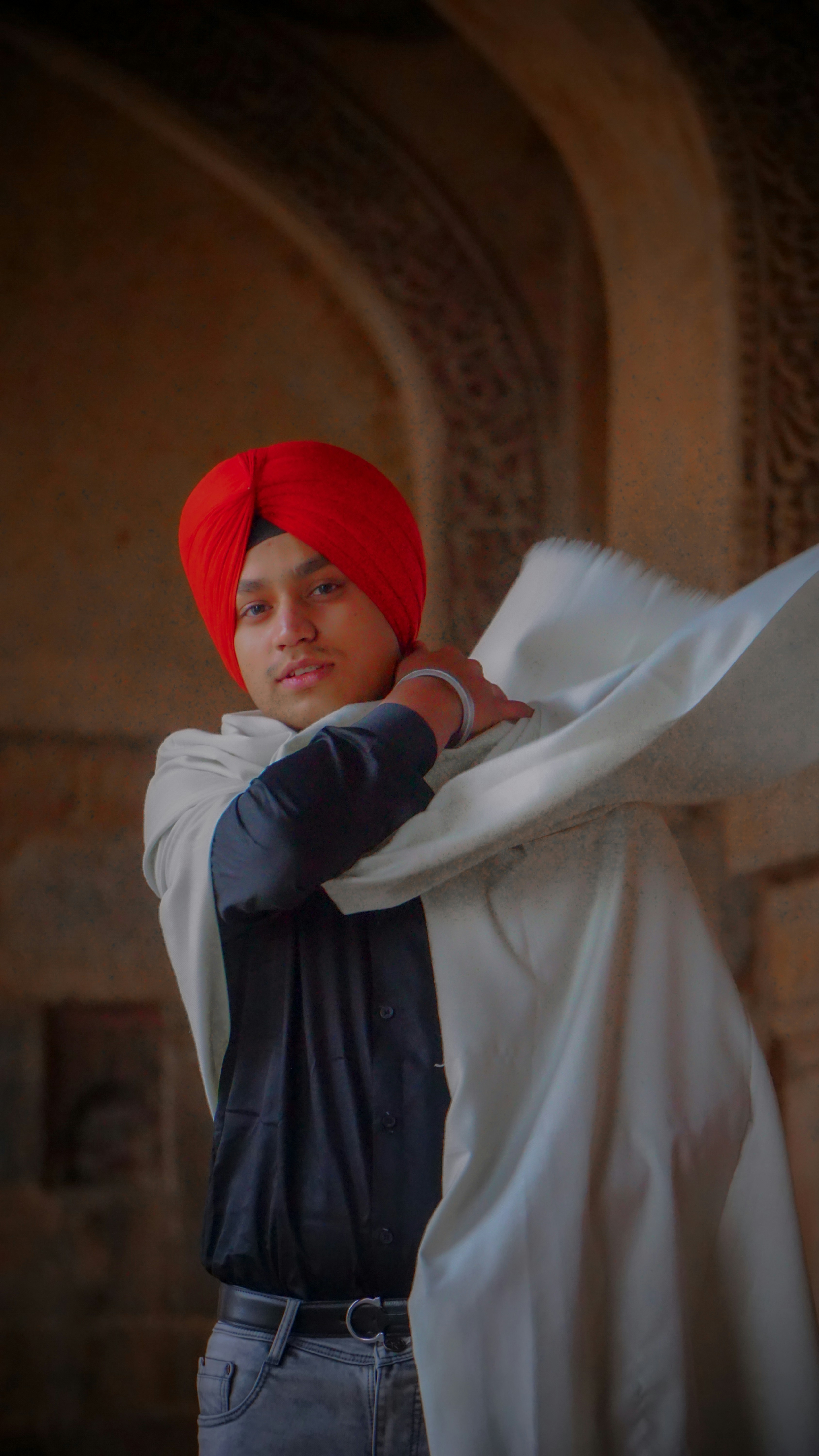 Red Turban, White Drapery: Portrait in an Ancient Archway