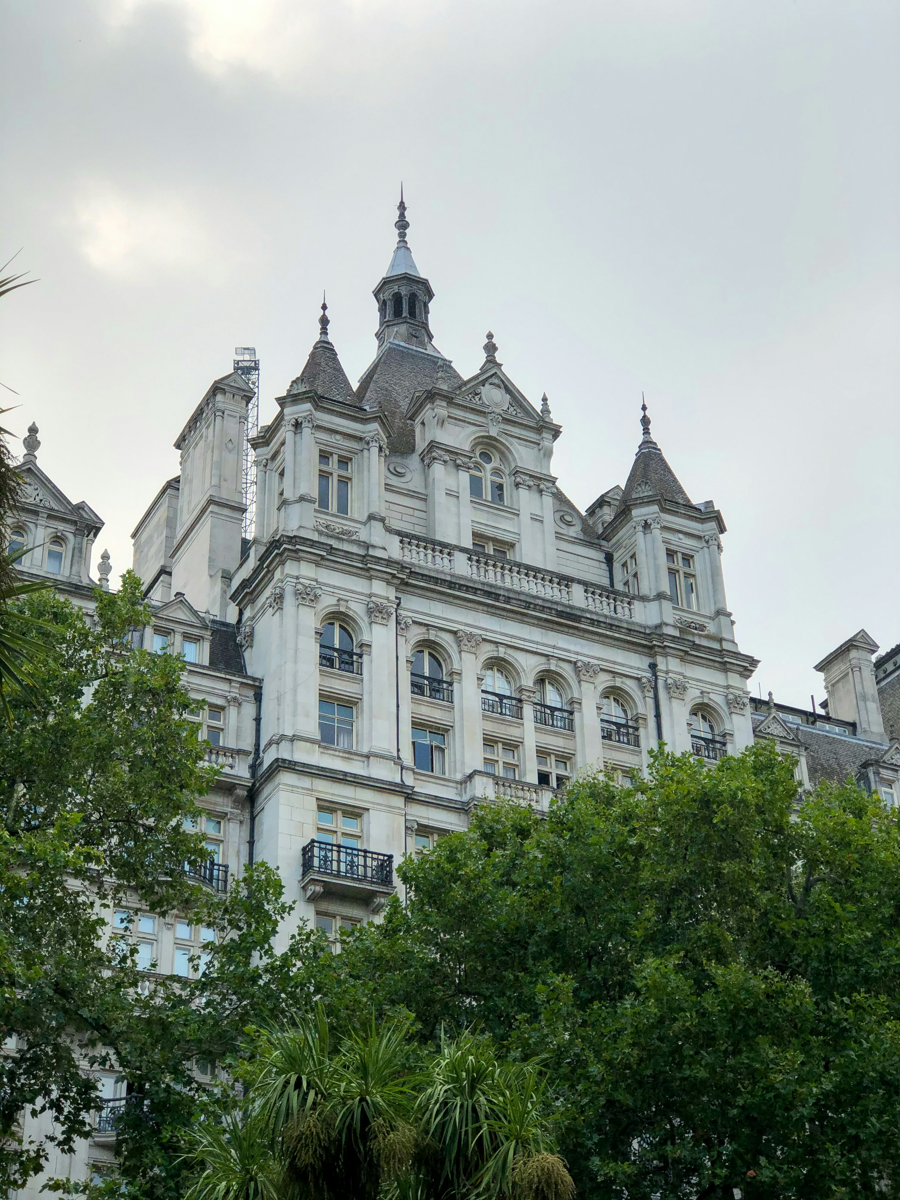 White concrete building near green trees during daytime photo – Free ...