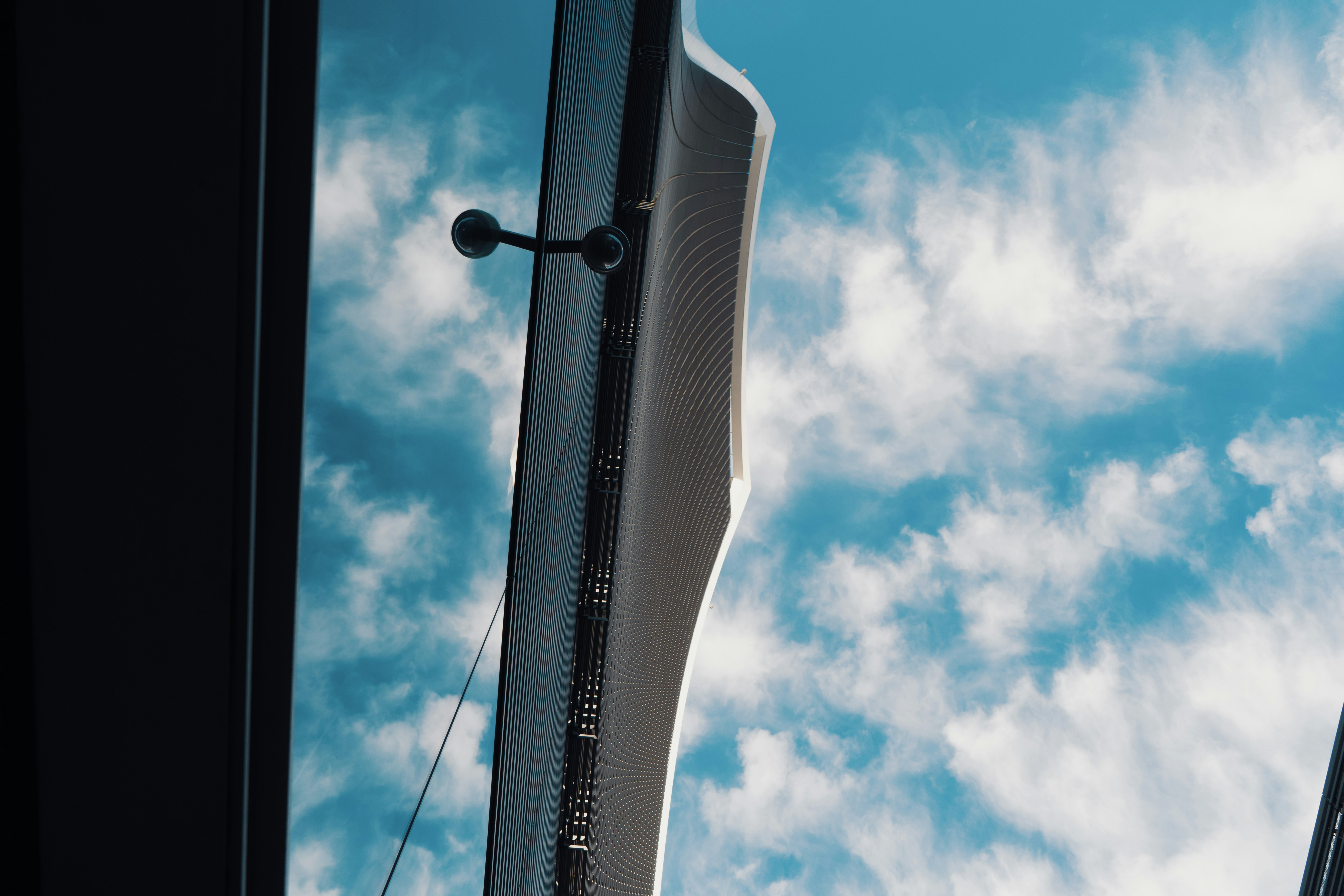 Curve of Shade Against a Brisk Blue Sky
