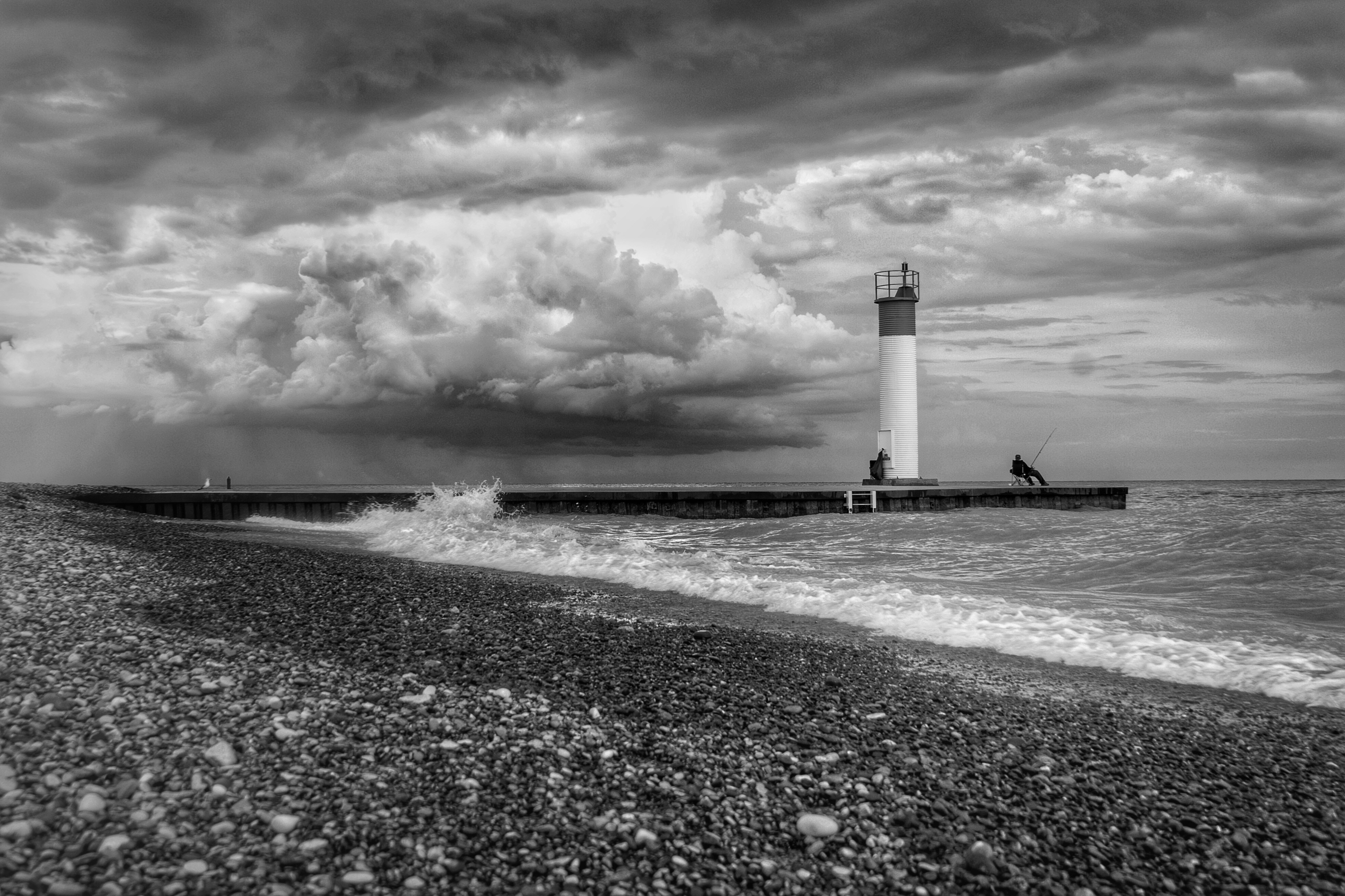 Grayscale photo of lighthouse on seashore photo – Free Grey Image on ...