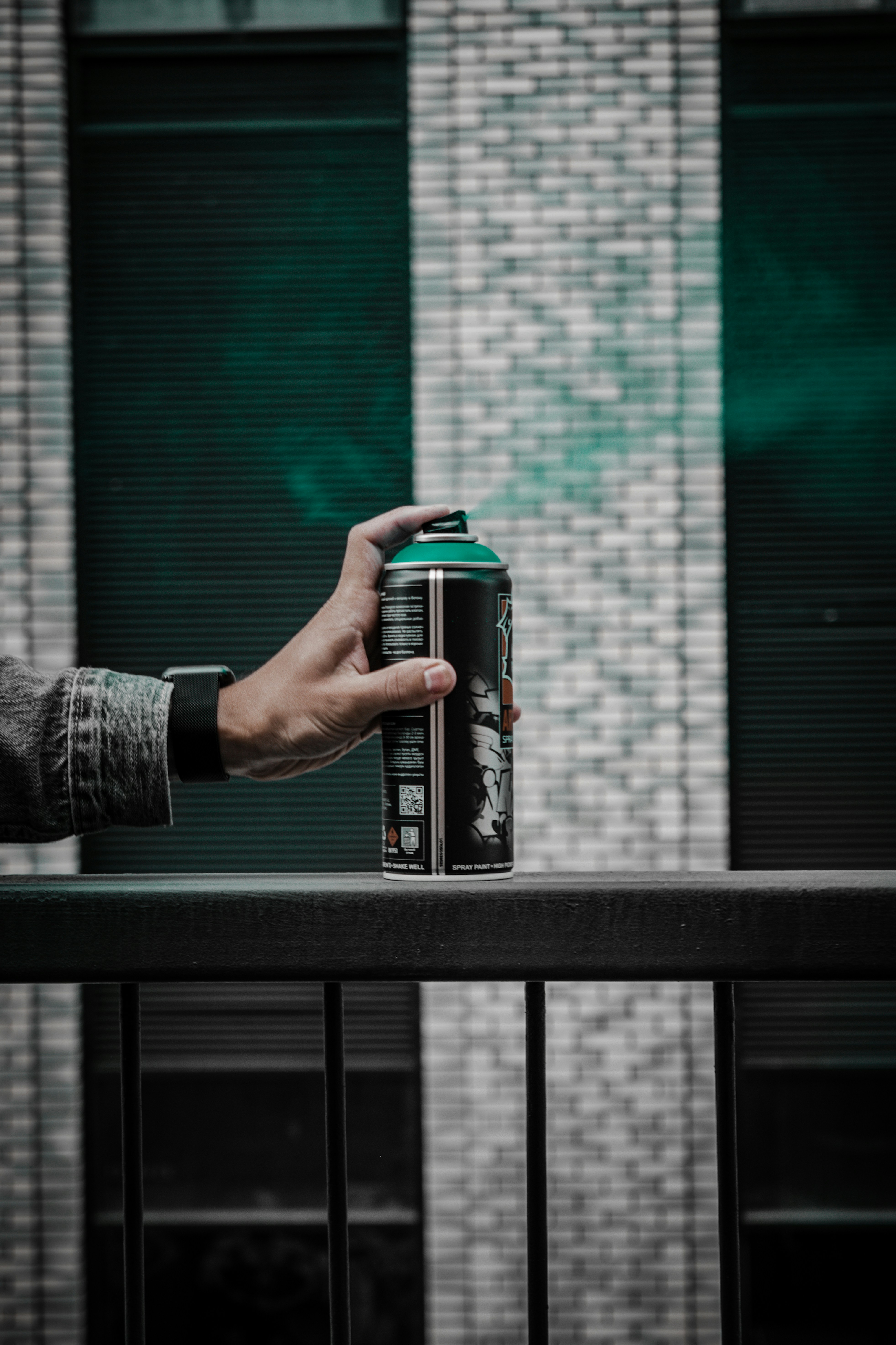 Spray Can in Focus: A Quiet Moment on a Concrete Balcony