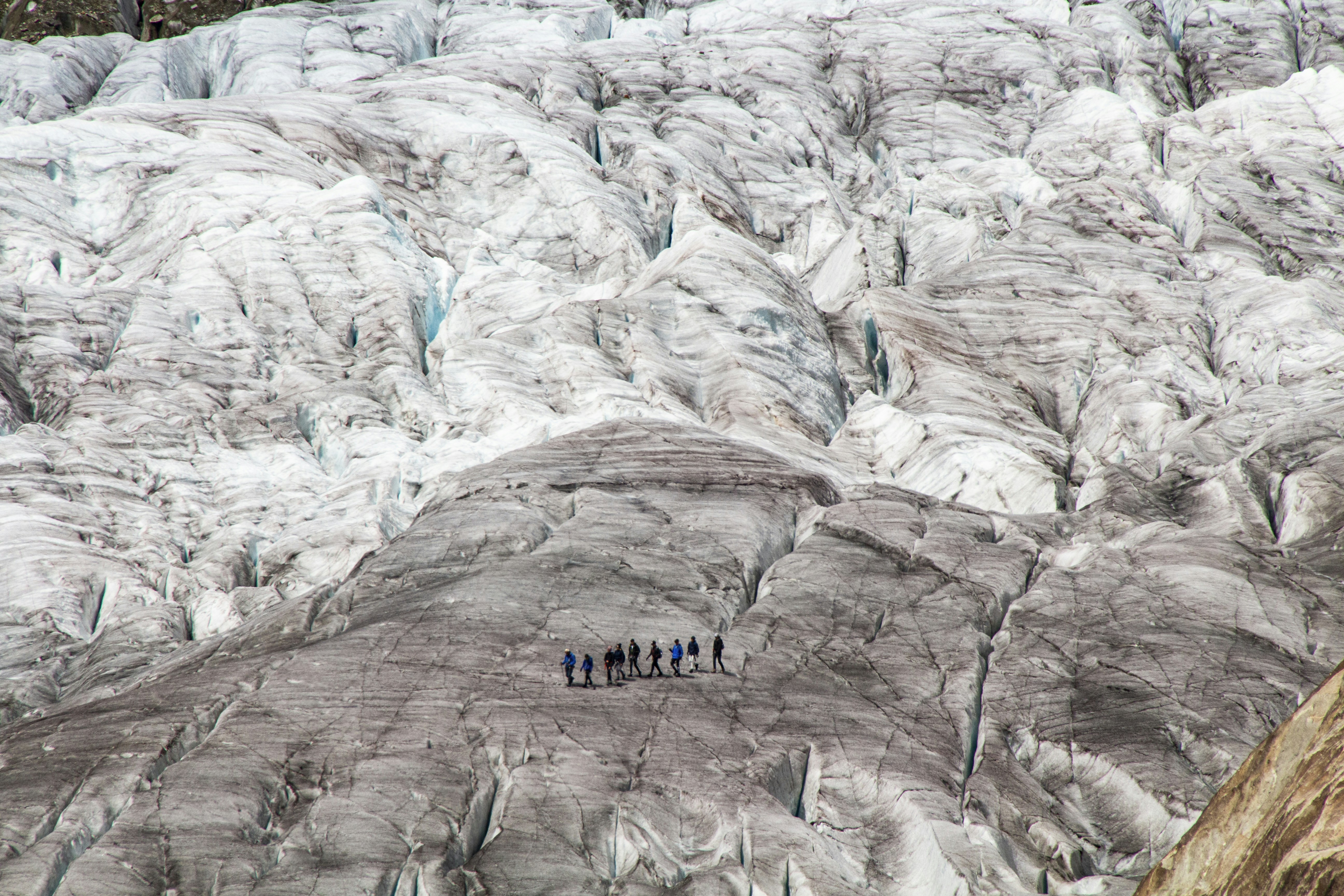 Glacial Ridge Trek: A Line of Explorers Across an Icefield