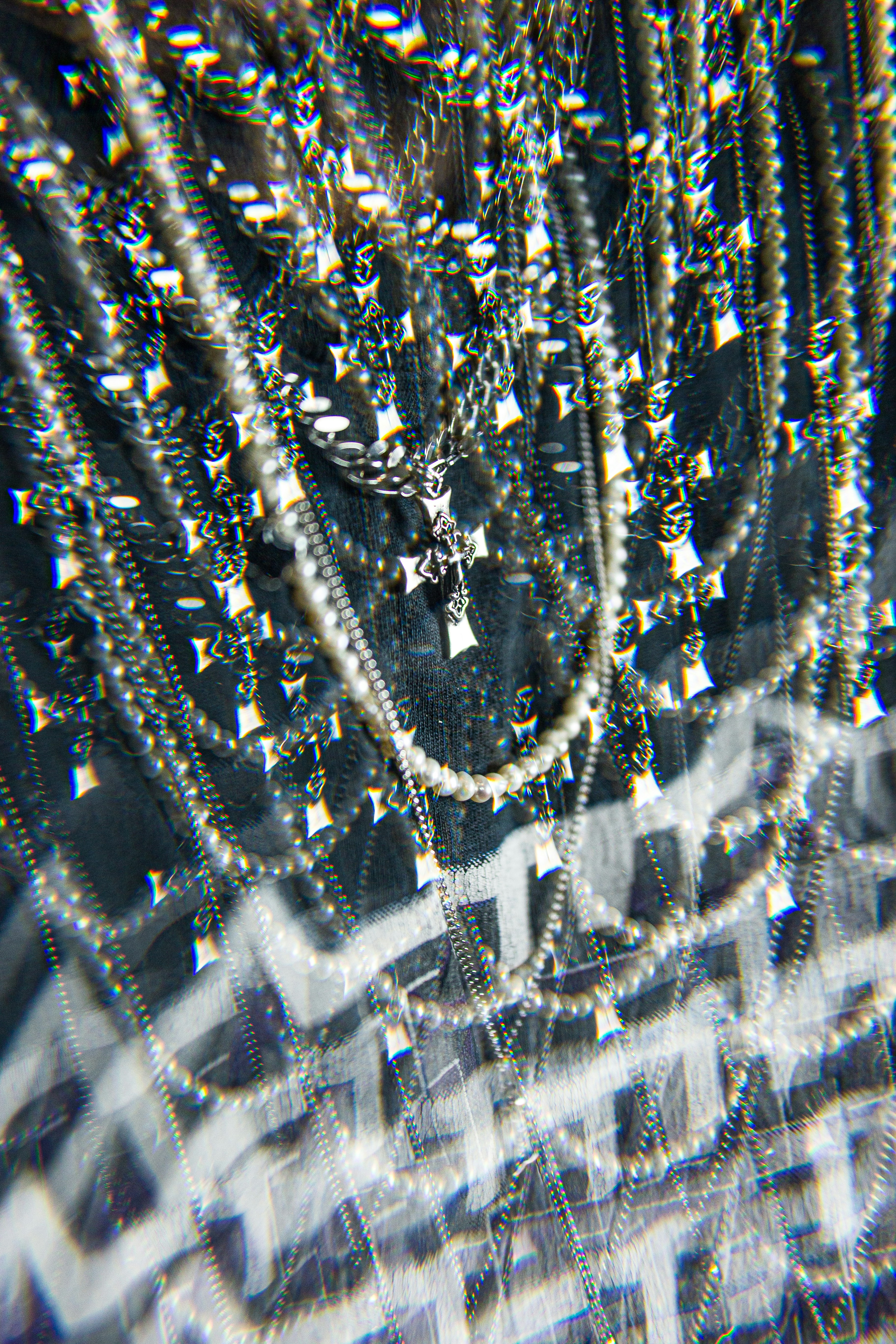 Beadwork in a Glassy Maze: A Macro Portrait of Reflections