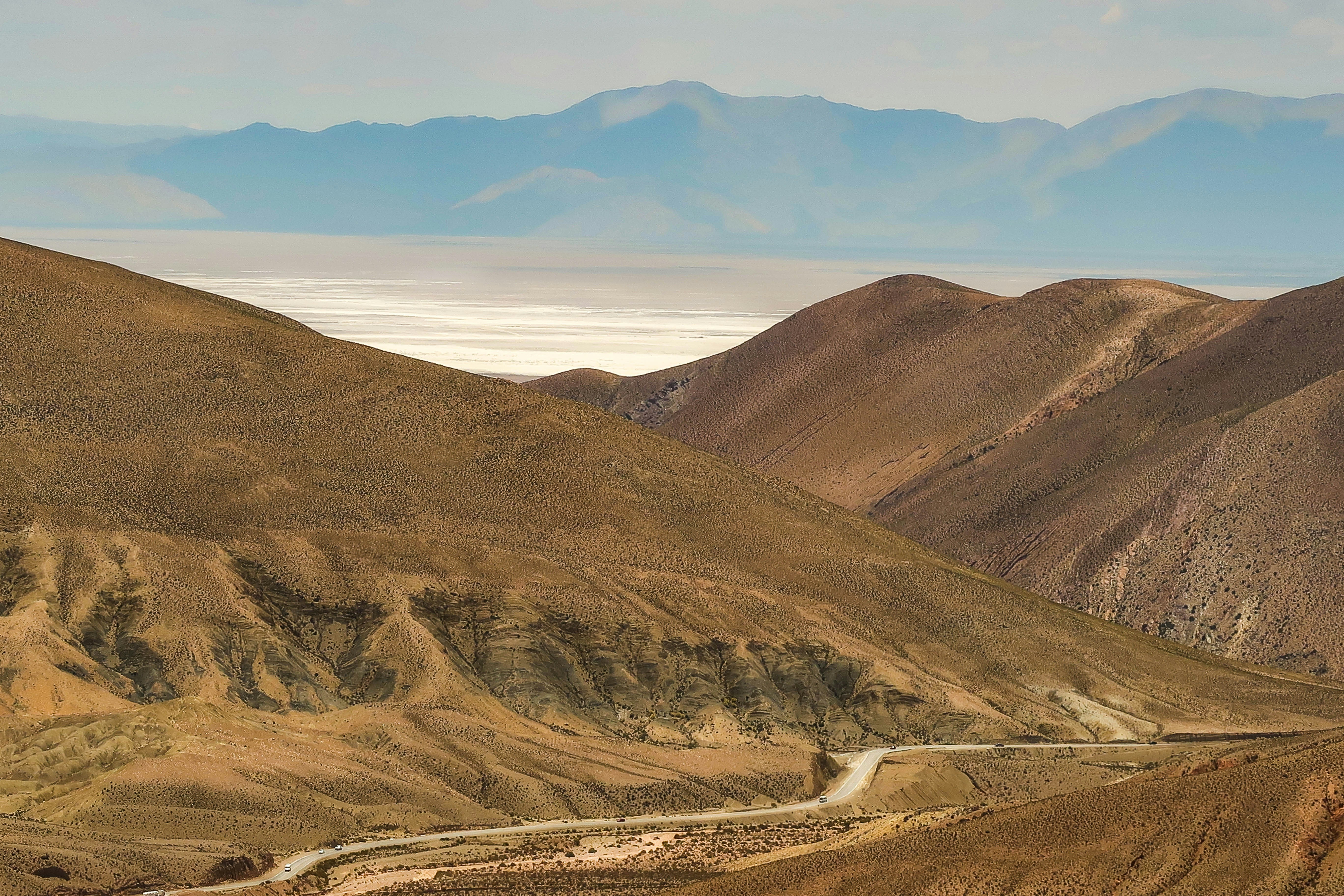 Brown mountains near body of water during daytime photo – Free Jujuy ...