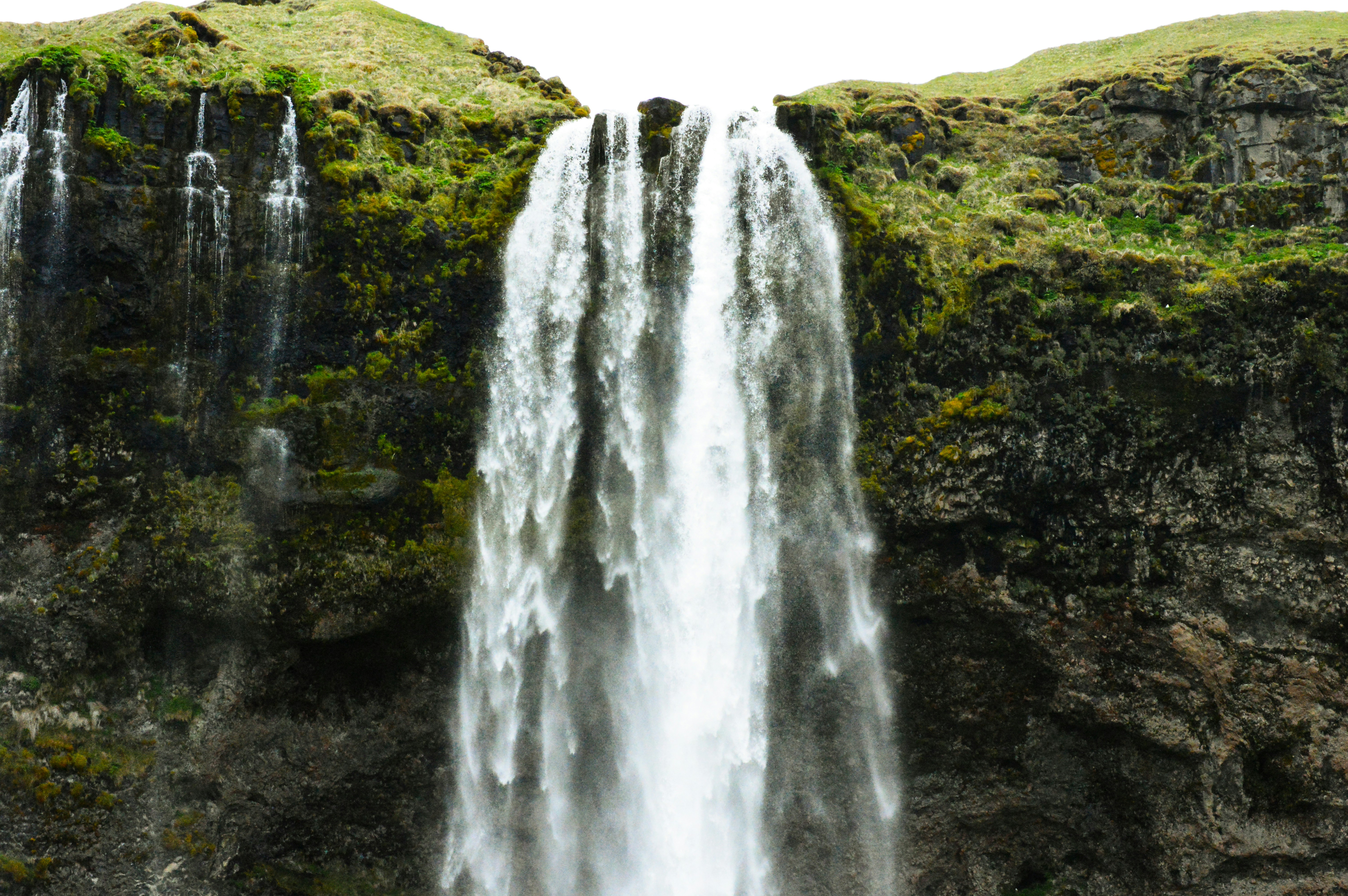 Waterfalls on green grass field during daytime photo – Free Iceland ...