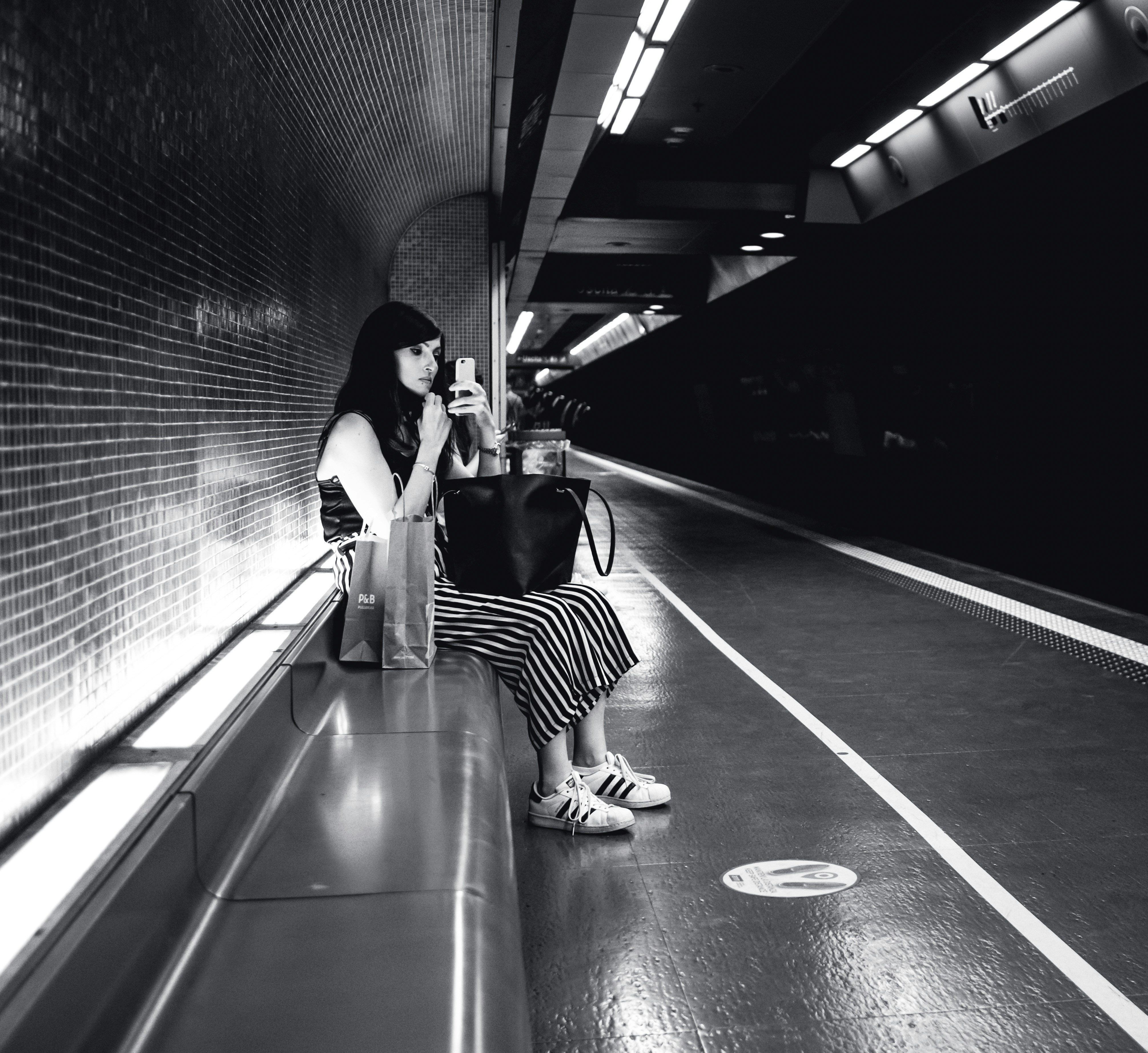 Subway Moment: A Quiet Portrait on the Platform