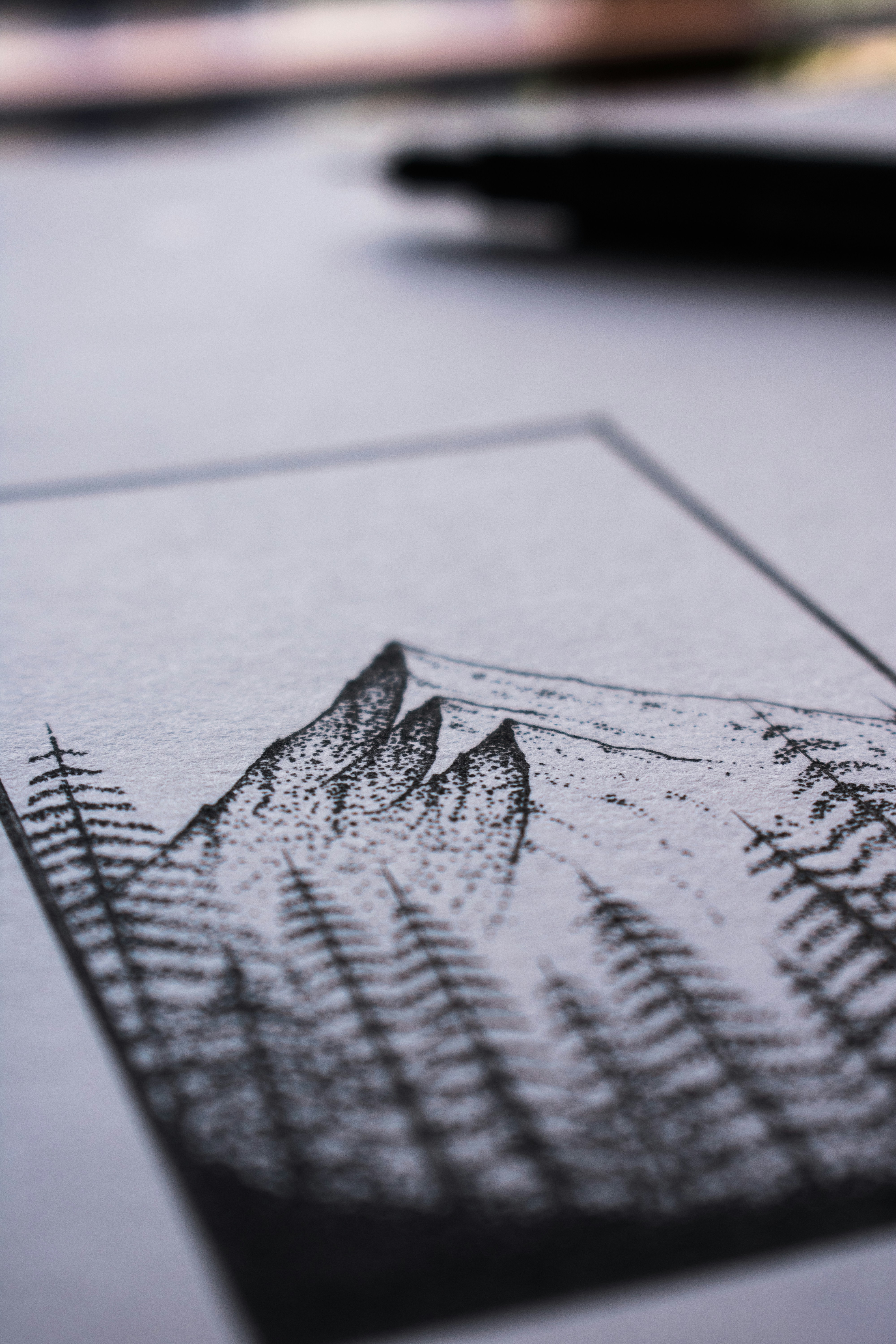 Ink Mountains on a Quiet Desk