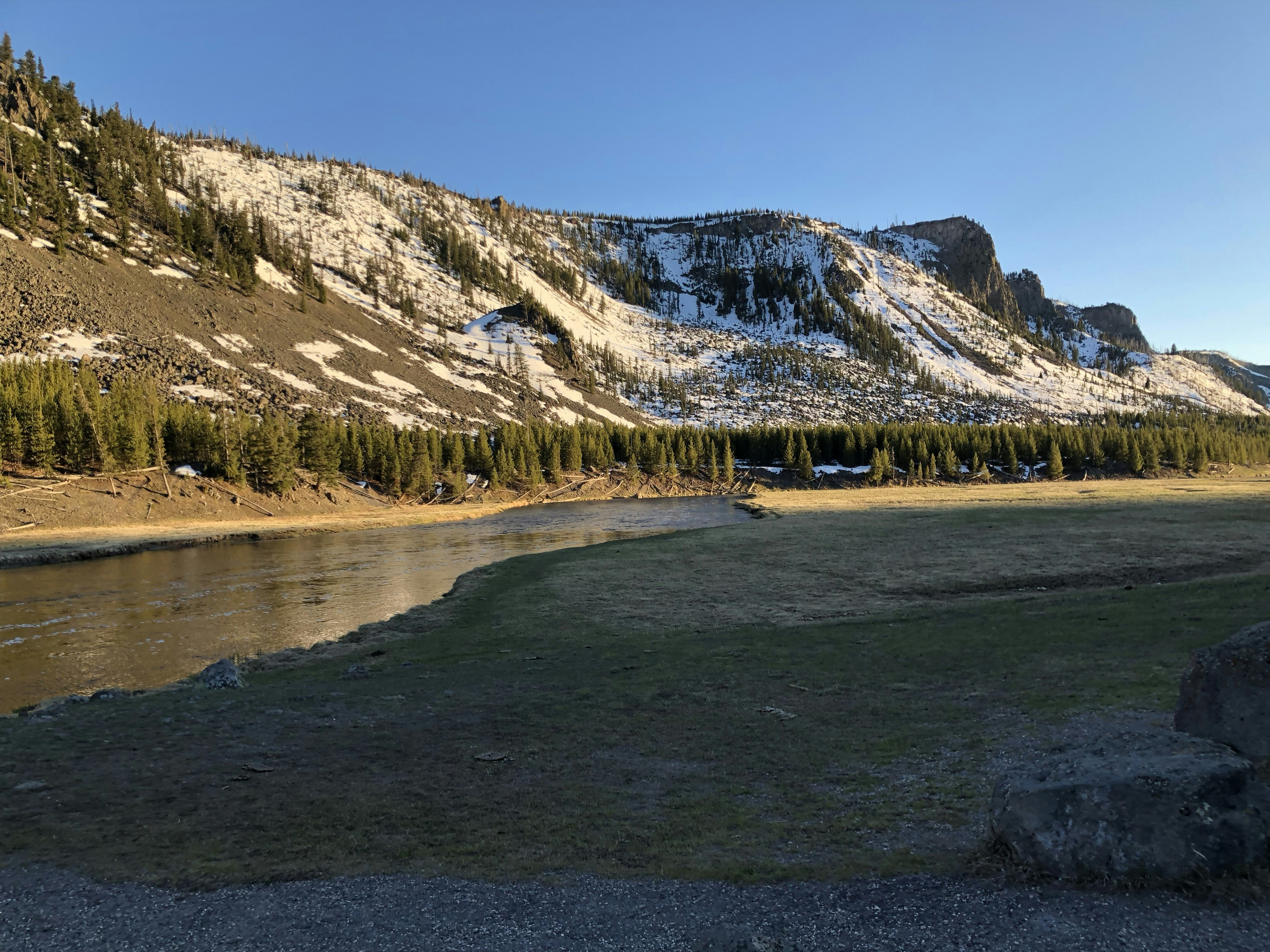 A mountain with a lake in the middle of it photo – Free Yellowstone ...