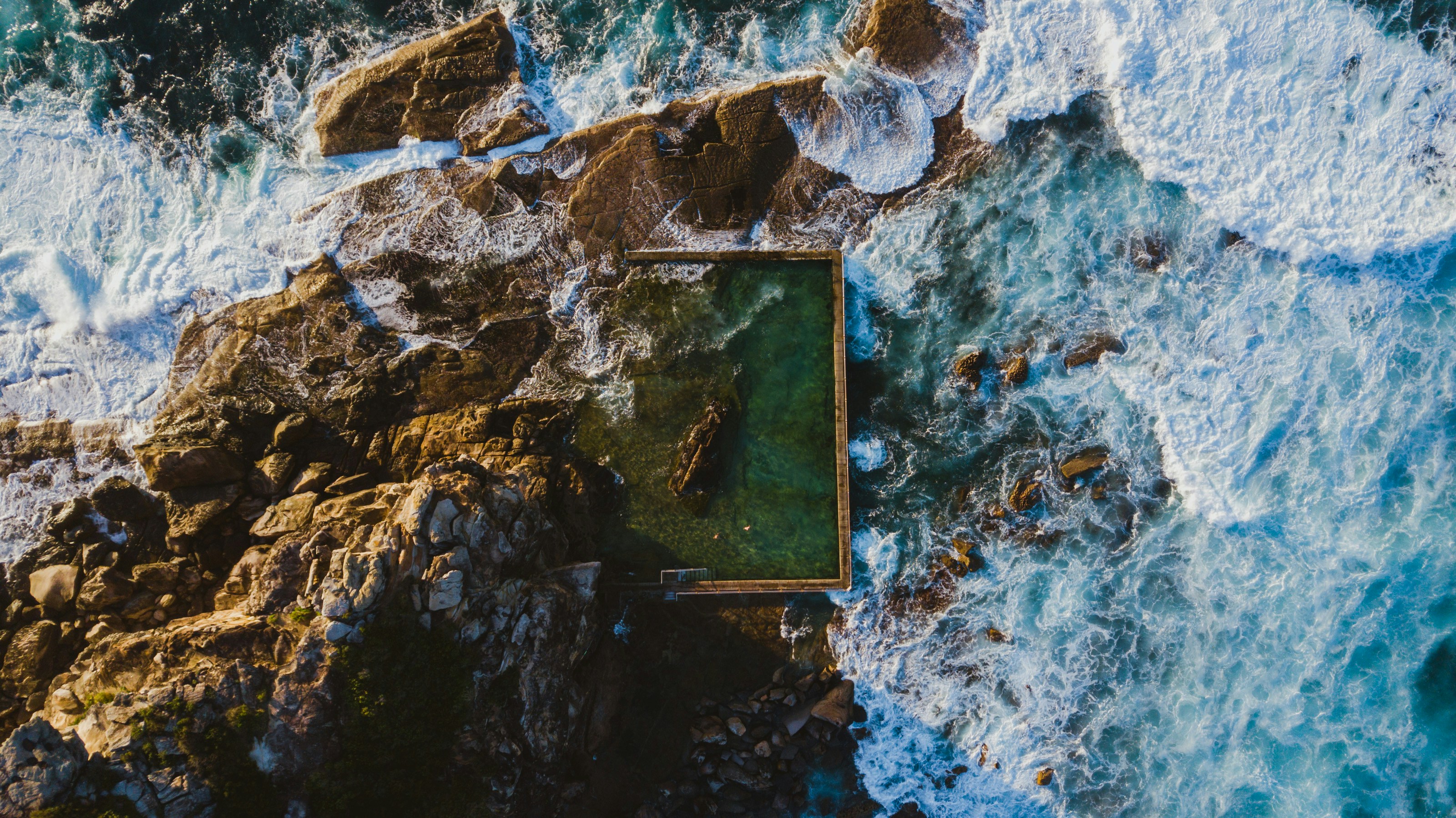 Eternal Swell - waves surrounding rock pool | black and white abstract painting