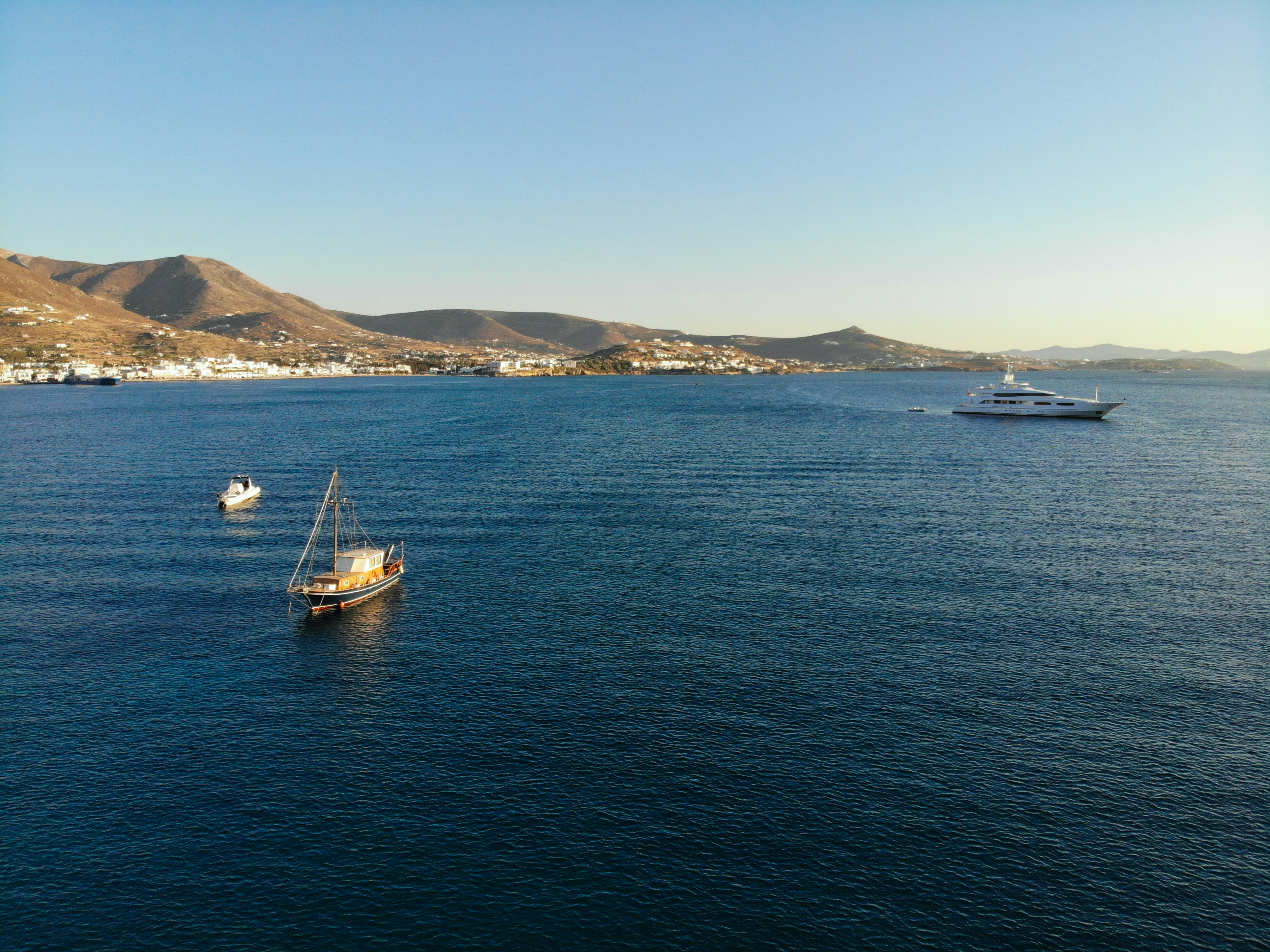 Drone shot taken above the waters of Paros island, Cyclades, Greece.