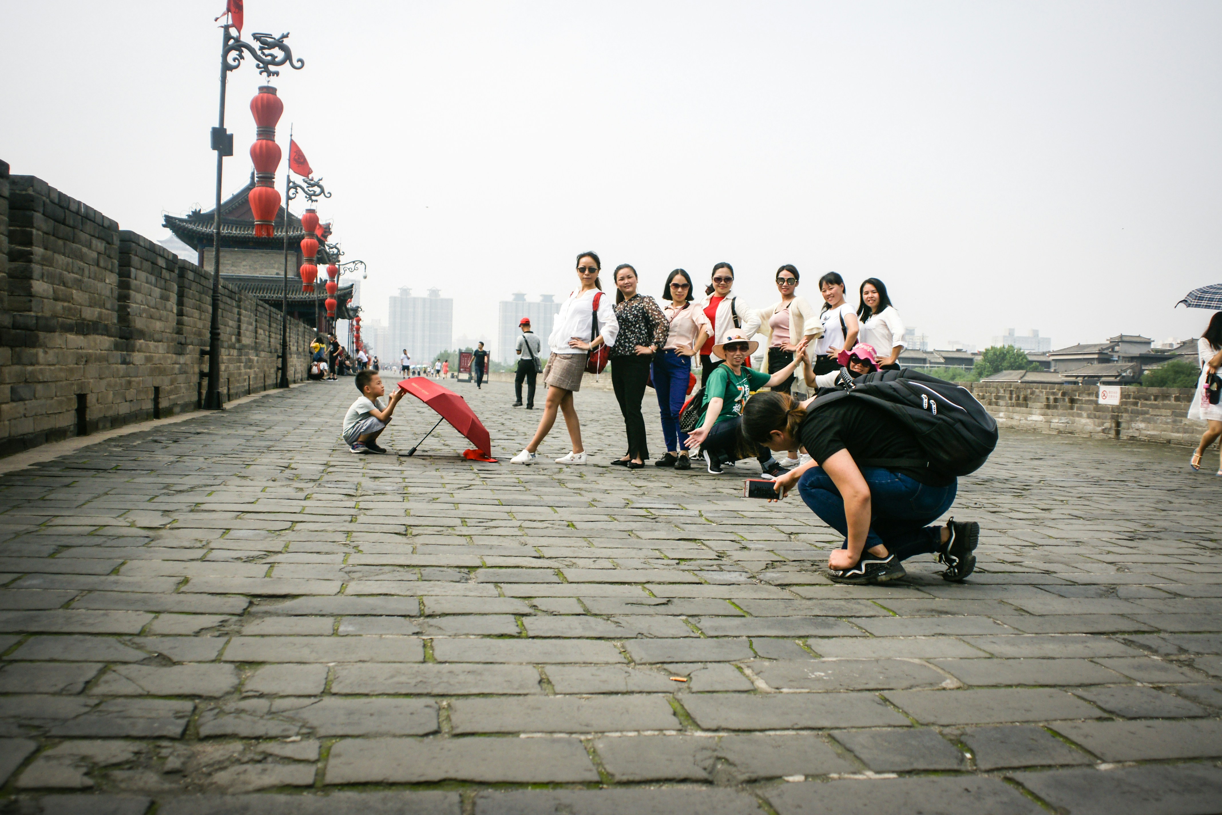 People sitting on concrete pavement during daytime photo – Free Human ...