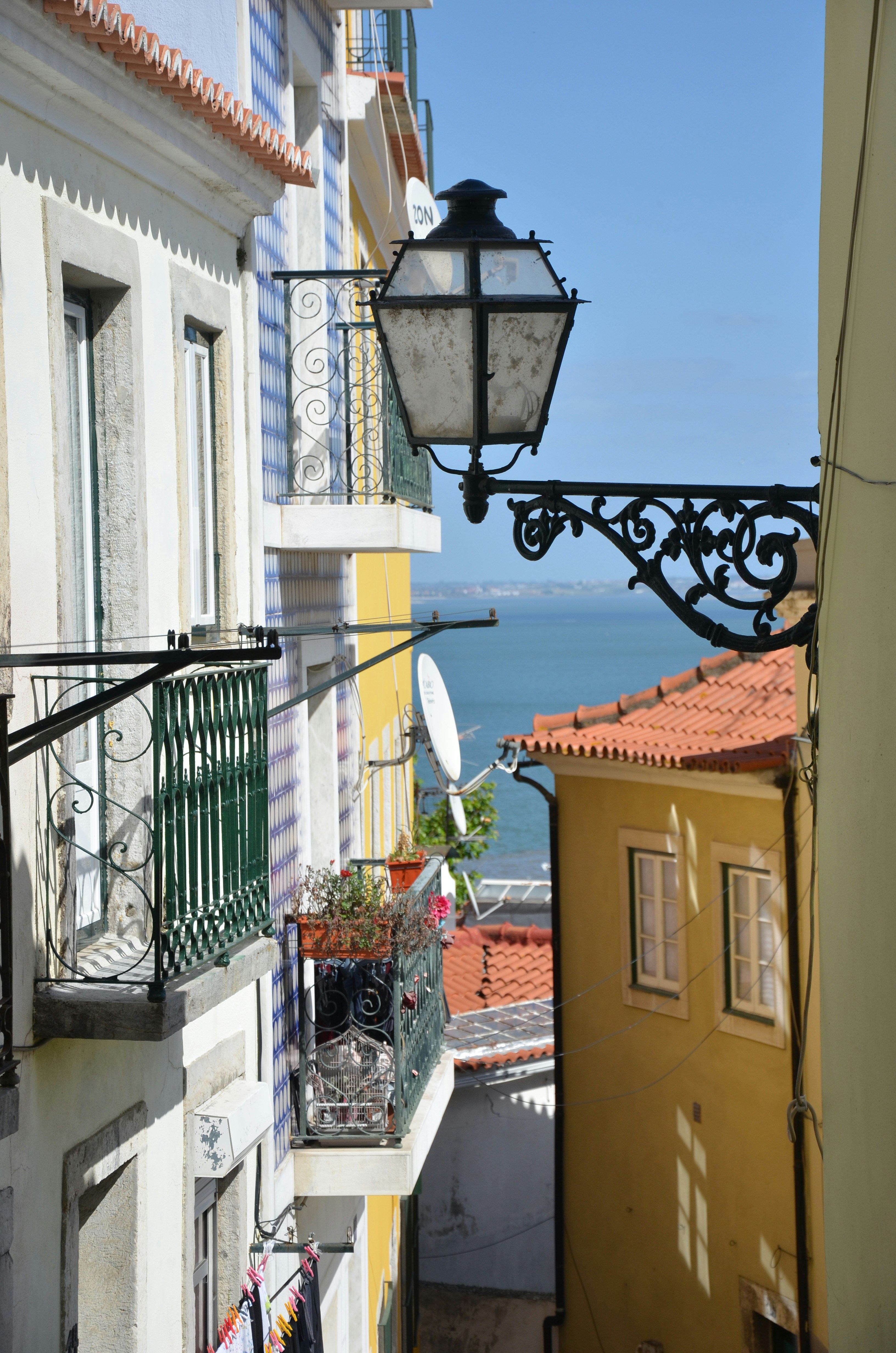 Lanterned Balcony Corridor: A Colorful Coastal Alley Toward the Sea