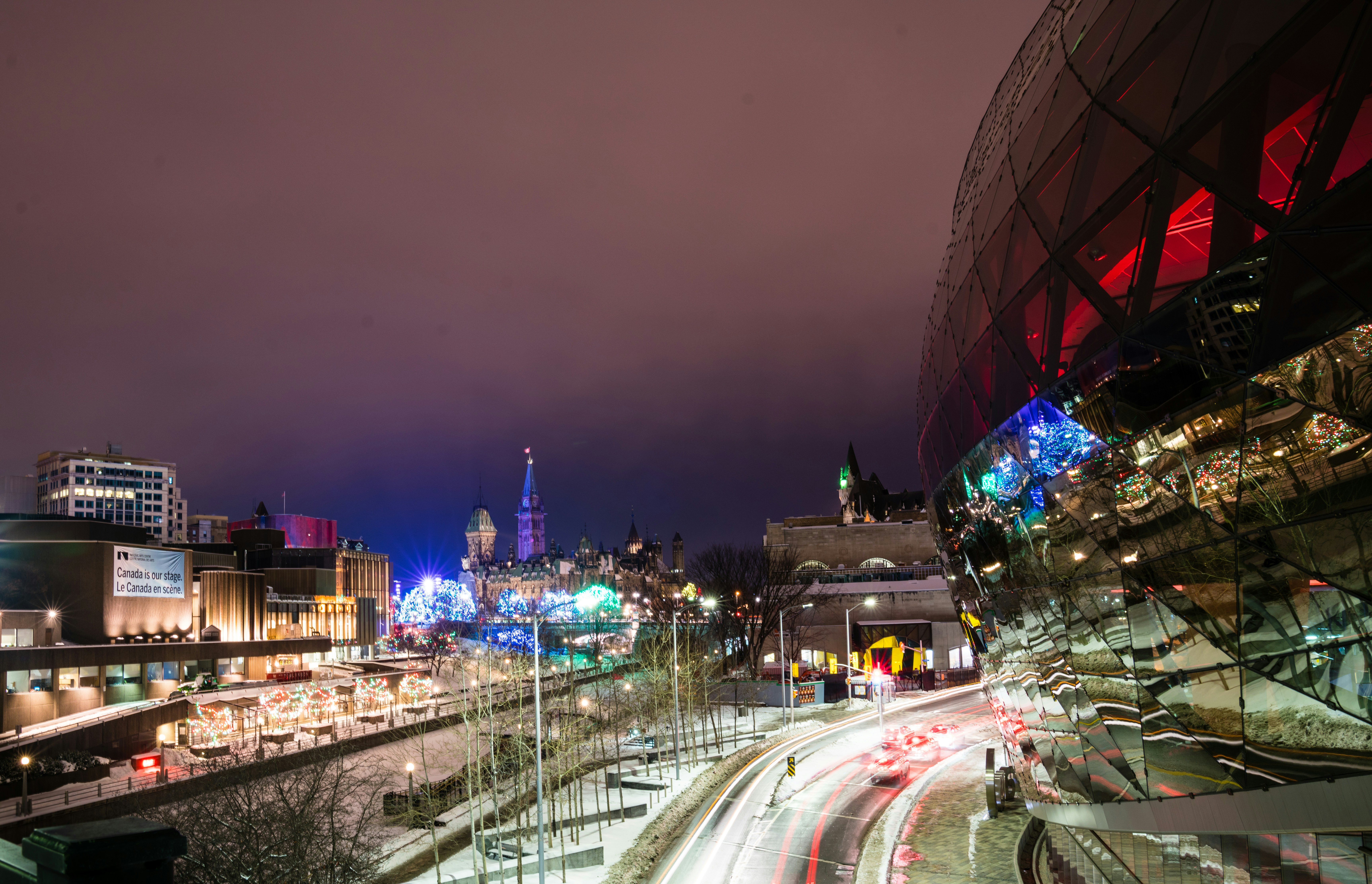 Orb and Rails: Night City Reflections on a Glass Dome
