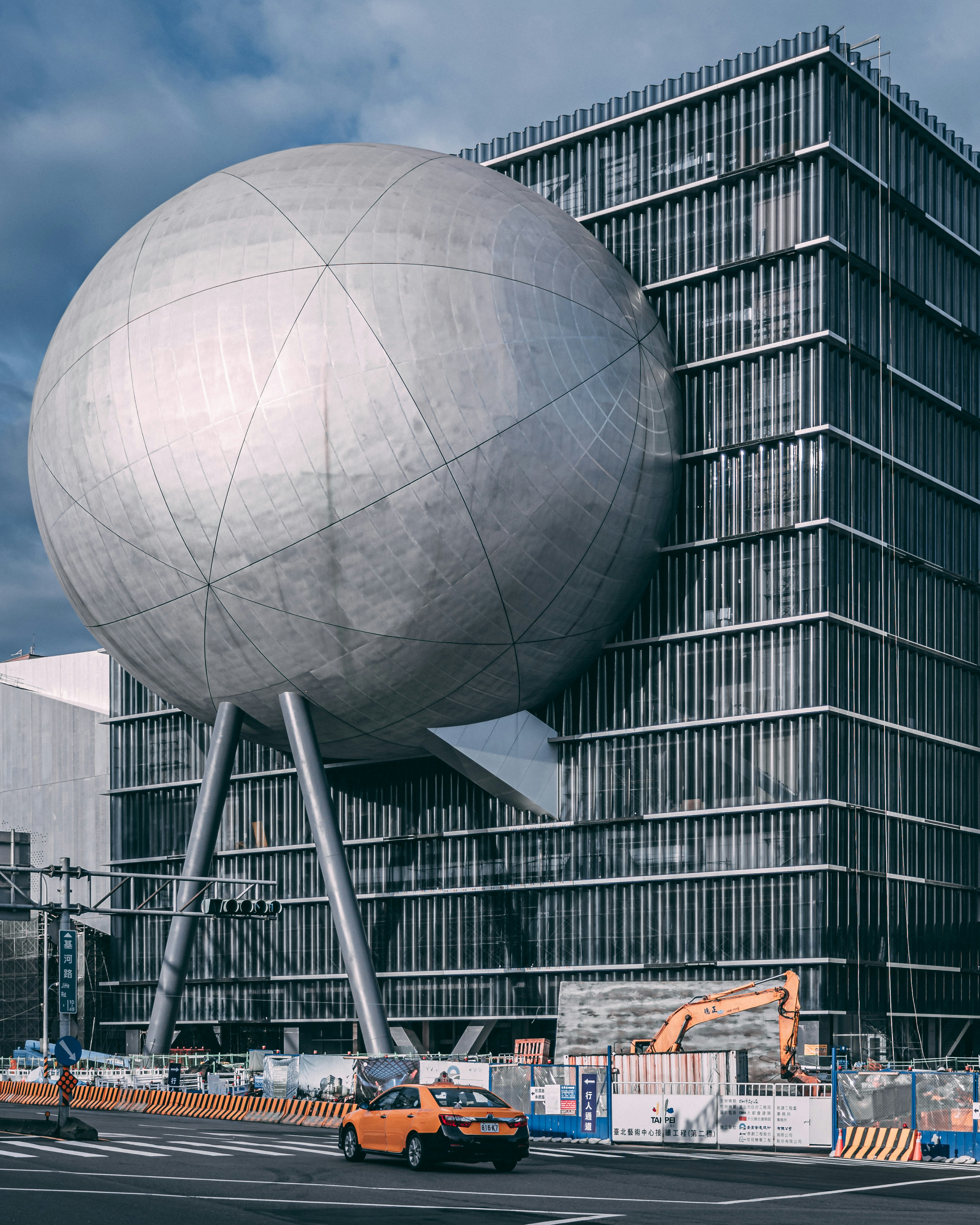 Industrial Sphere: The Giant Ball Dominating a Modern Crane-City Facade