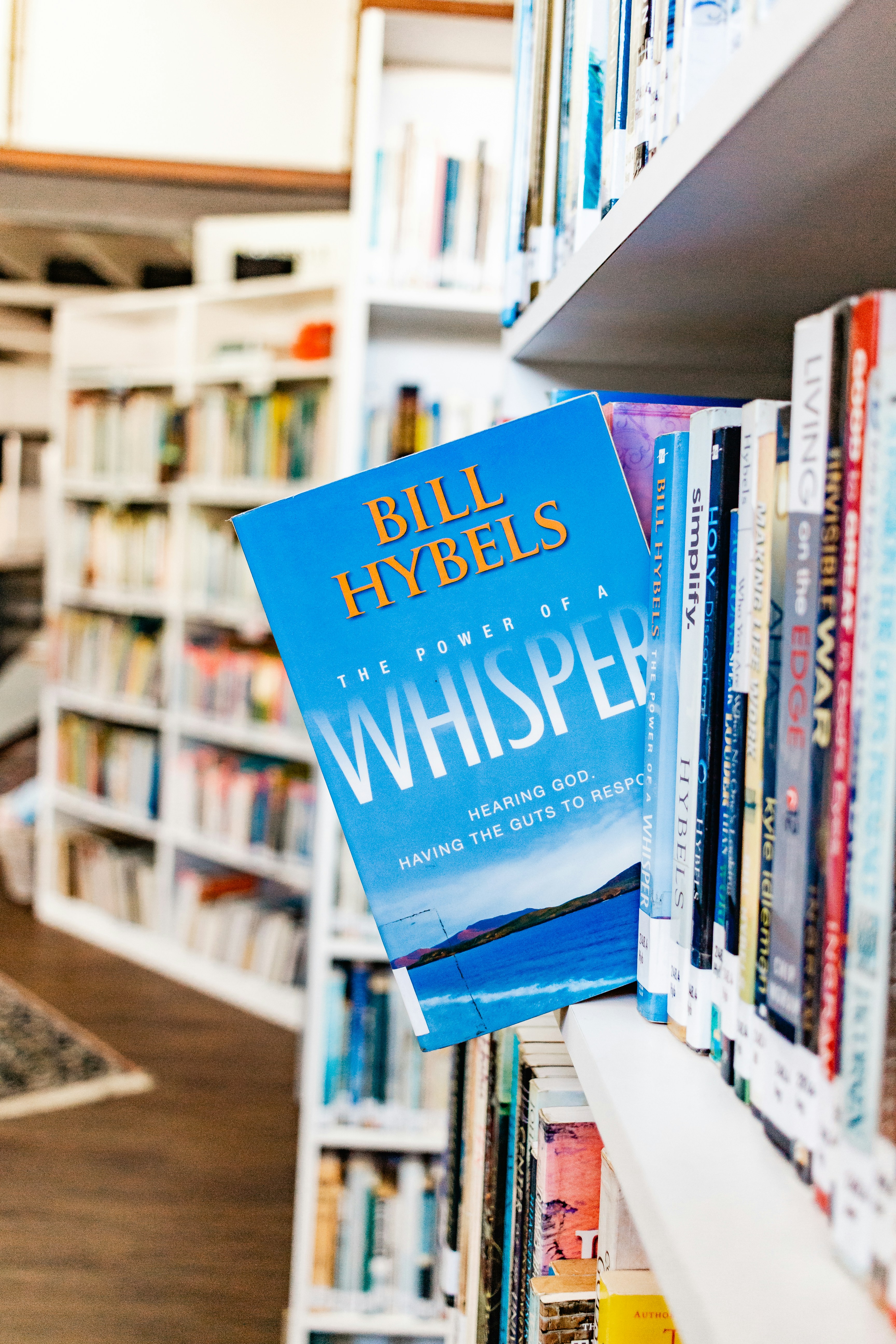 Blue and white book on brown wooden book shelf photo – Free Harvest ...