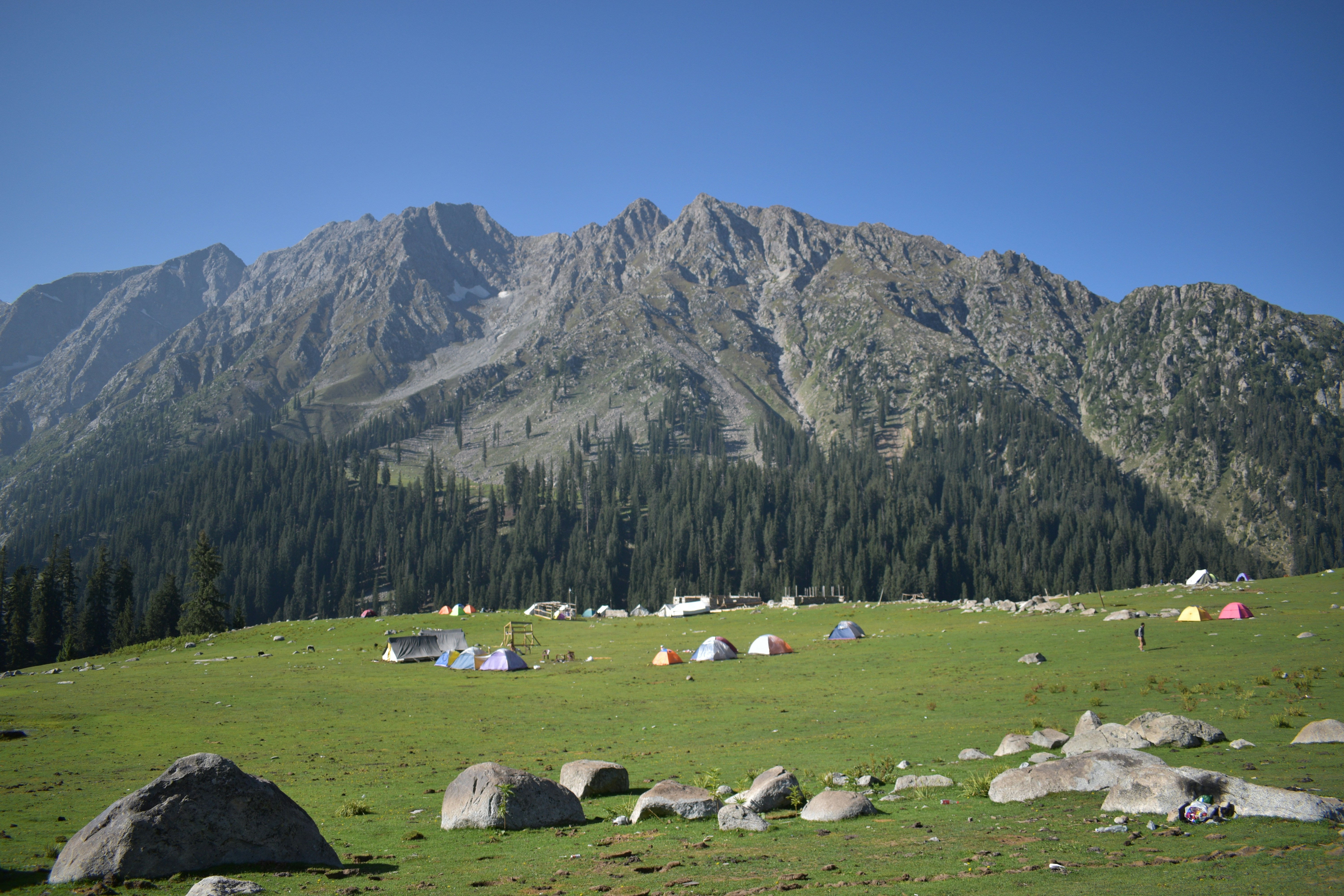 Tranquil Campsite Beneath Majestic Peaks