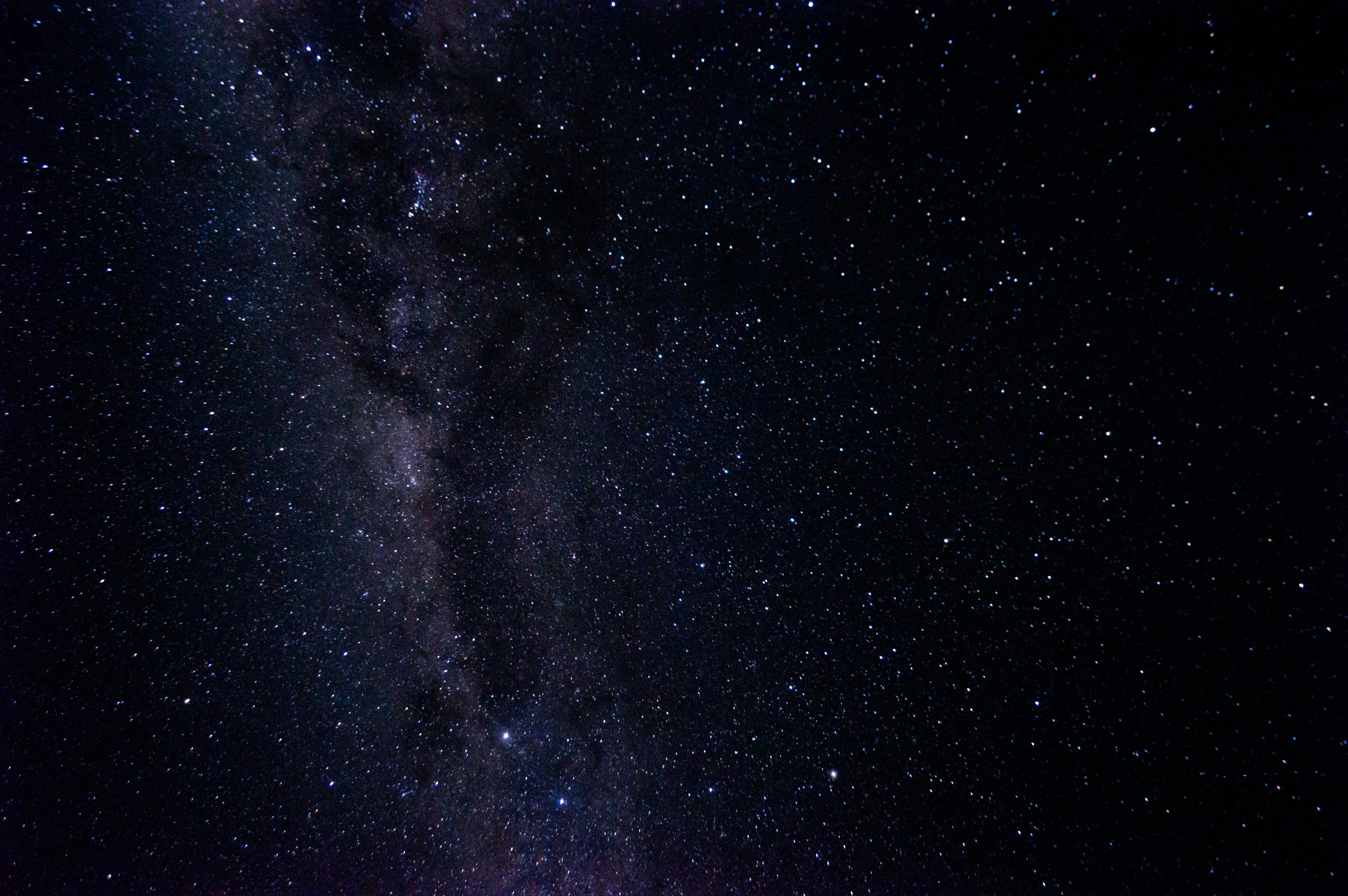 Vast expanse of the night sky filled with countless stars and the Milky Way galaxy, showcasing the beauty of the cosmos.