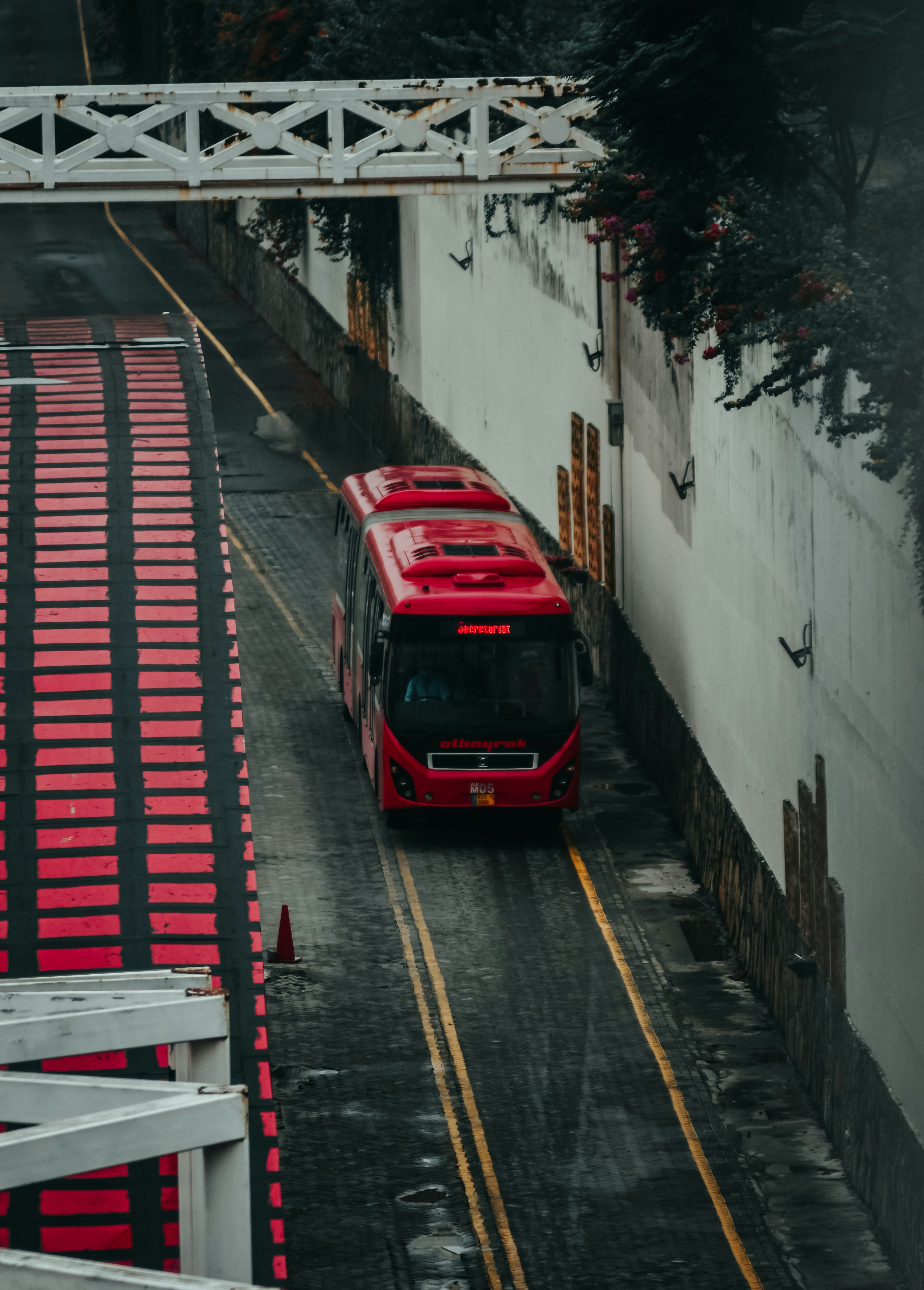 Red and black bus on road during daytime photo – Free Bus Image on Unsplash