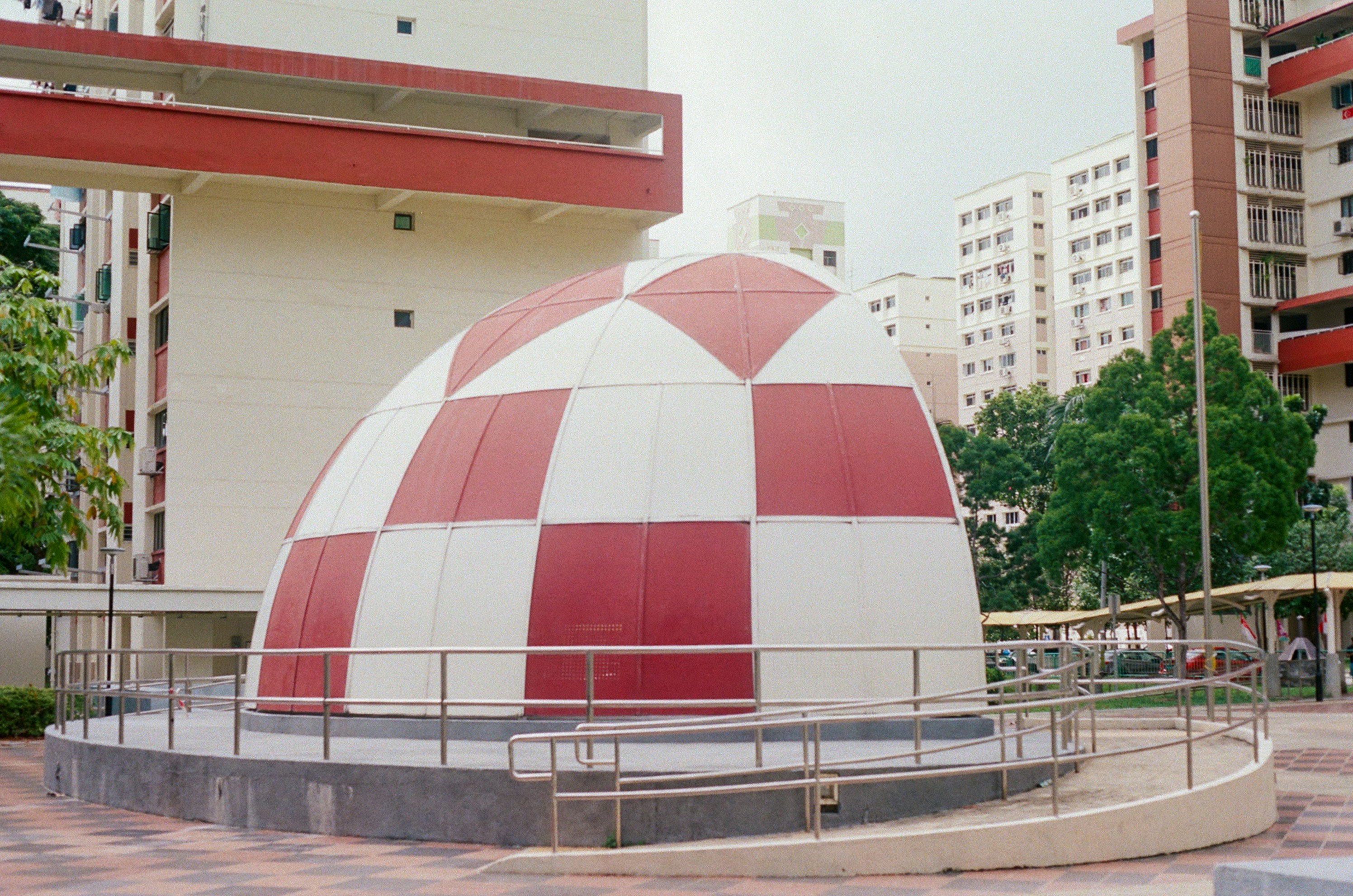 Red and white round building photo – Free Building Image on Unsplash