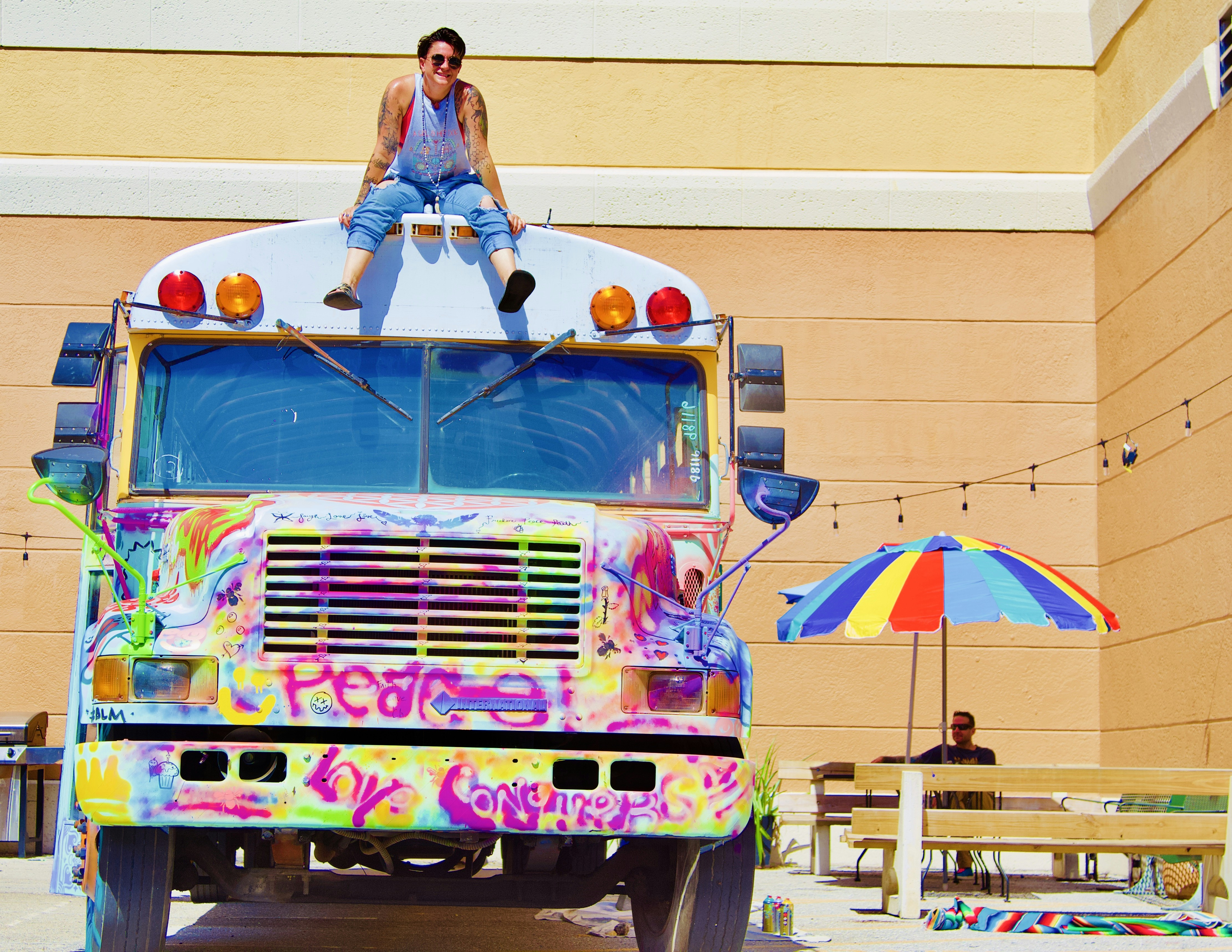 Vibrant Street Truck Throne: A Rebel perched atop a graffiti-painted vehicle