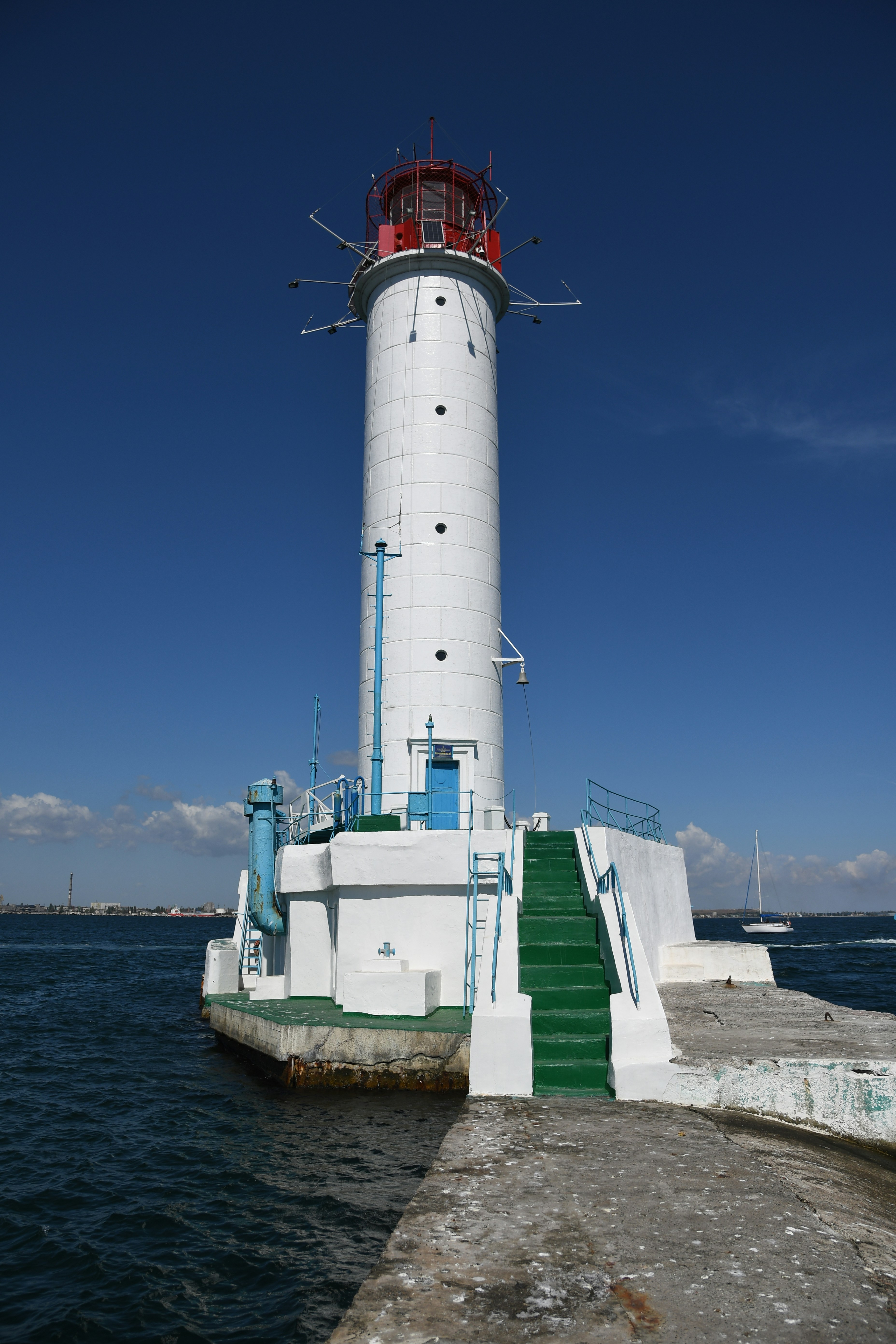 White and red lighthouse near body of water during daytime photo – Free ...