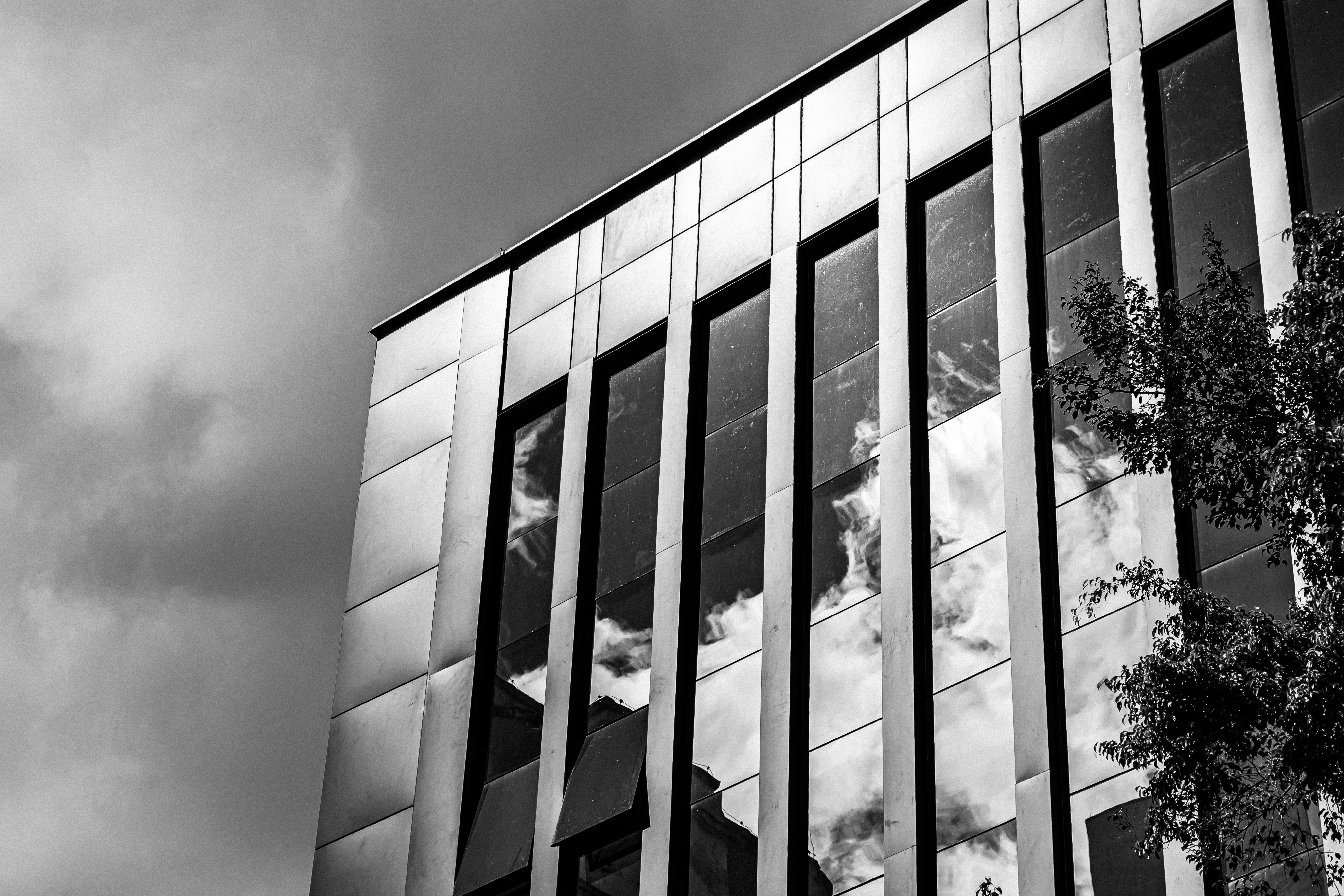 Grayscale photo of glass window photo – Free Liberdade Image on Unsplash