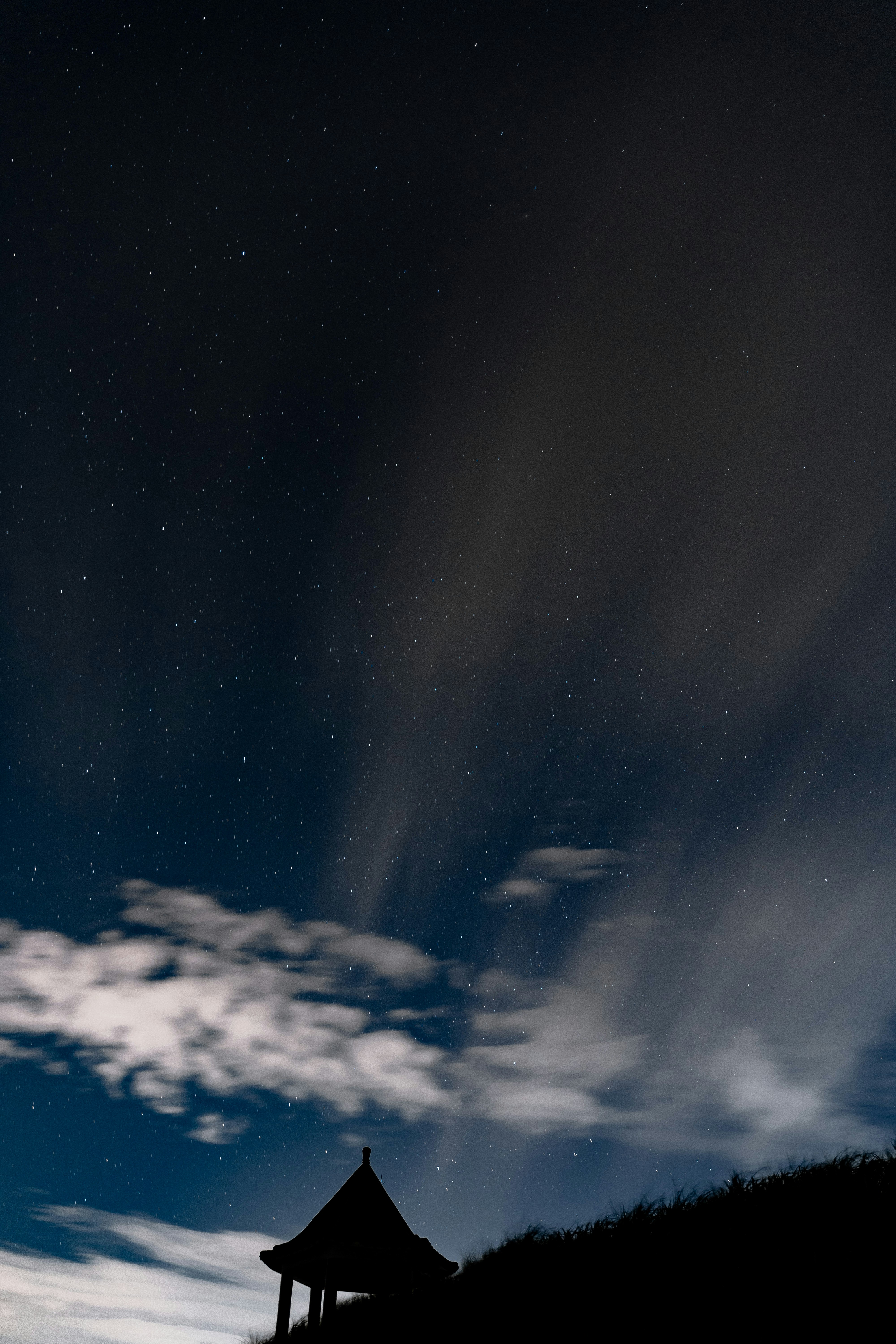Lone Pagoda Beneath a Star-Field Night Sky