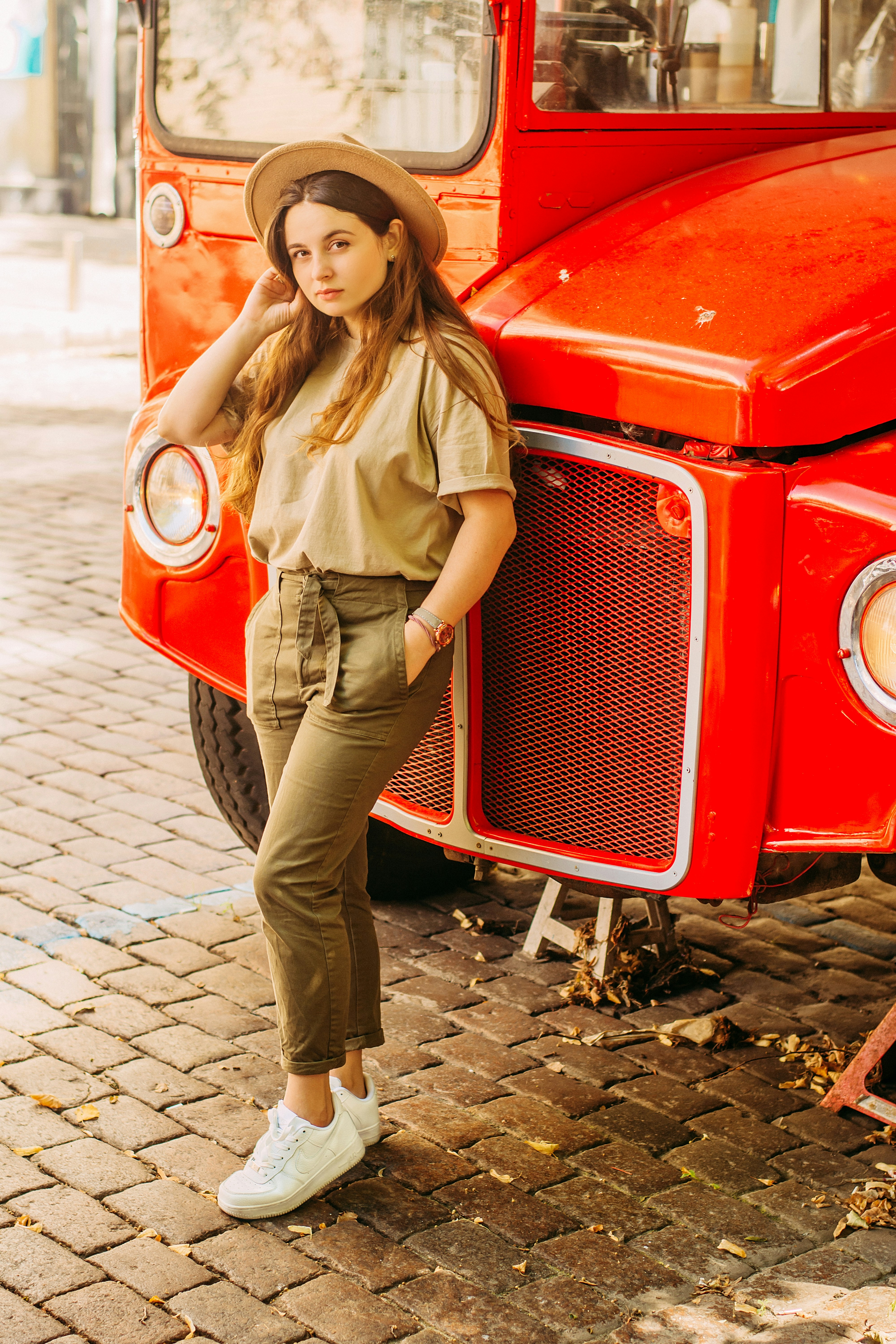 Quiet Confidence by a Scarlet Classic Bus