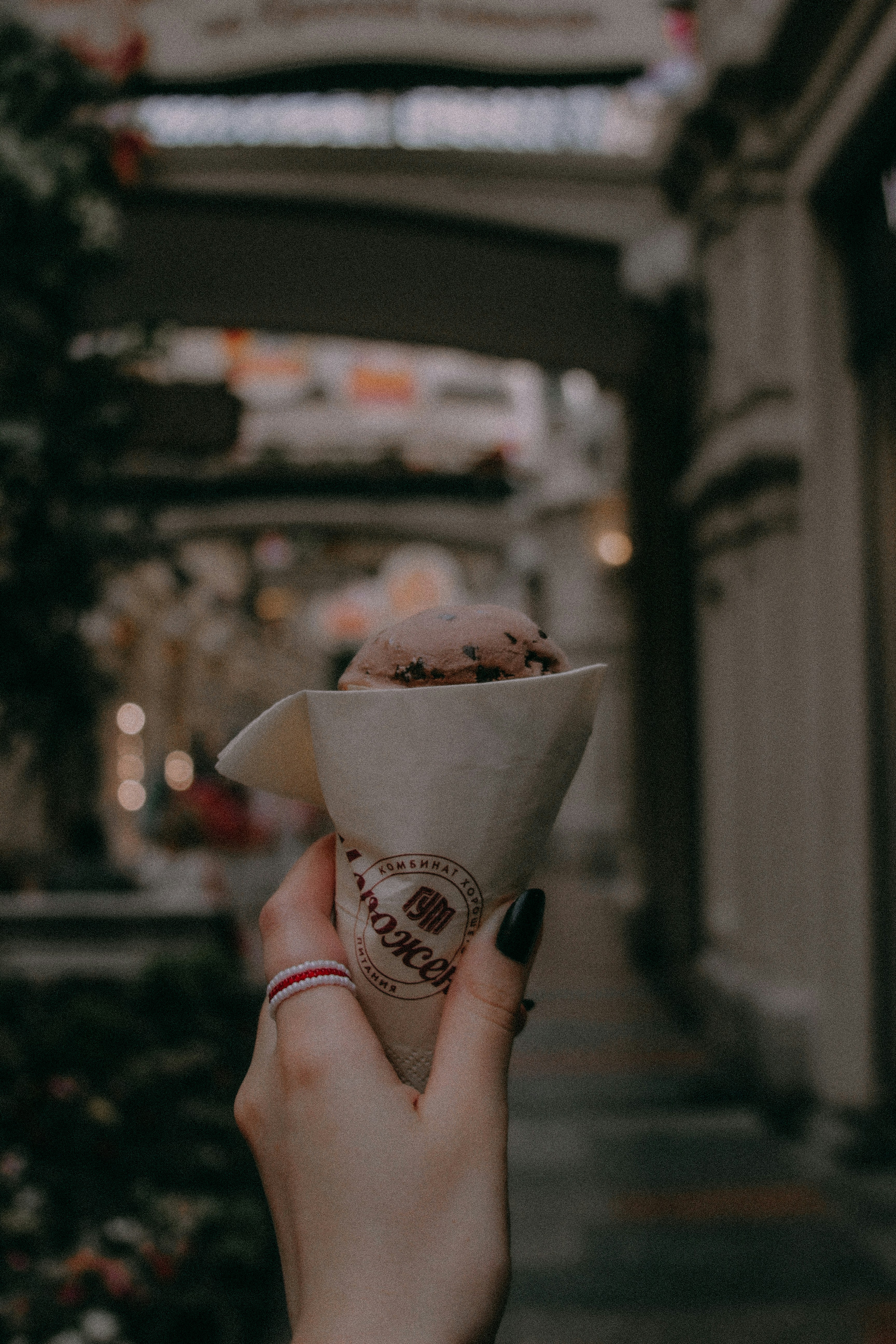 person holding ice cream cone