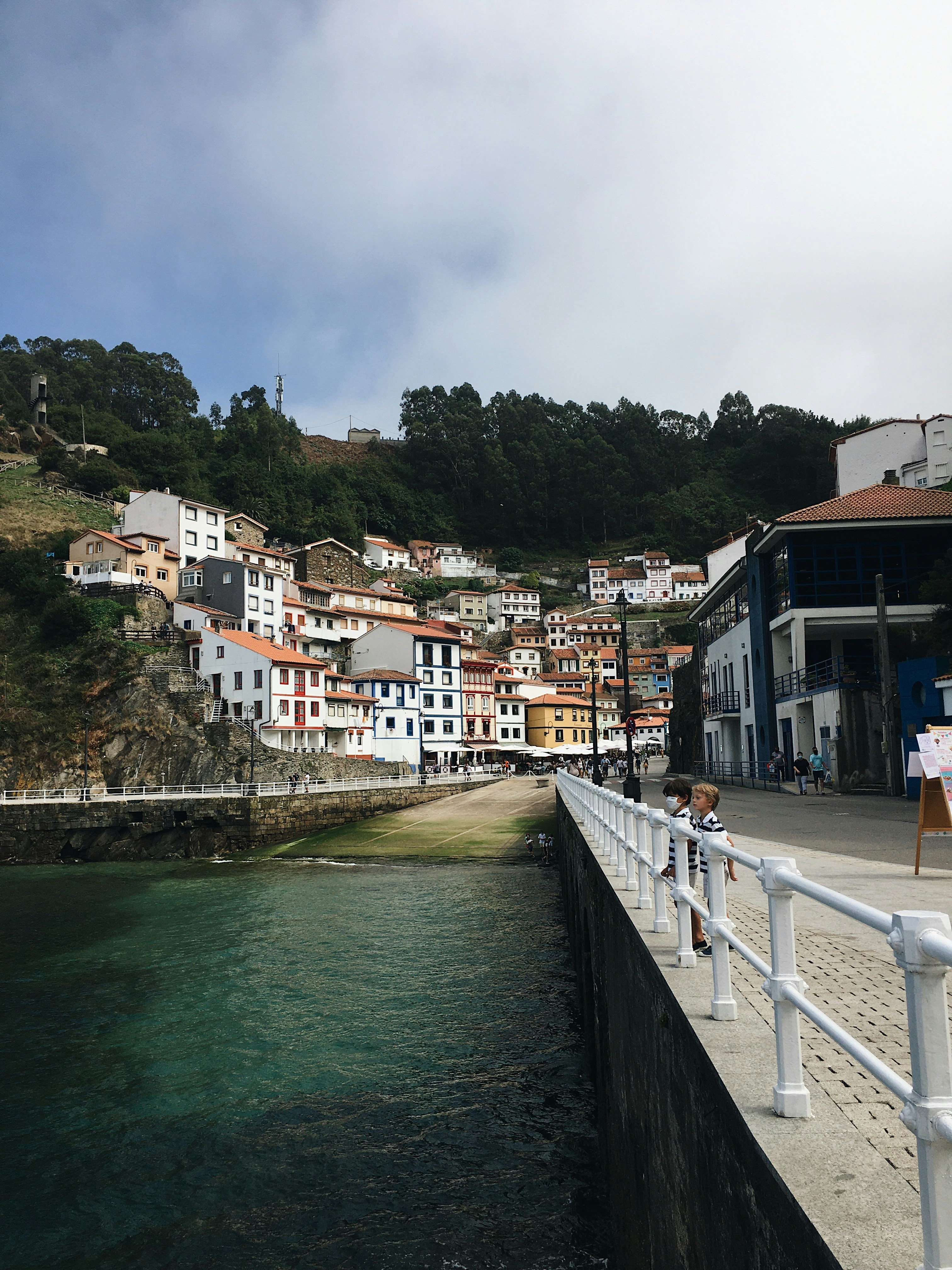 Colorful hillside village by the quay