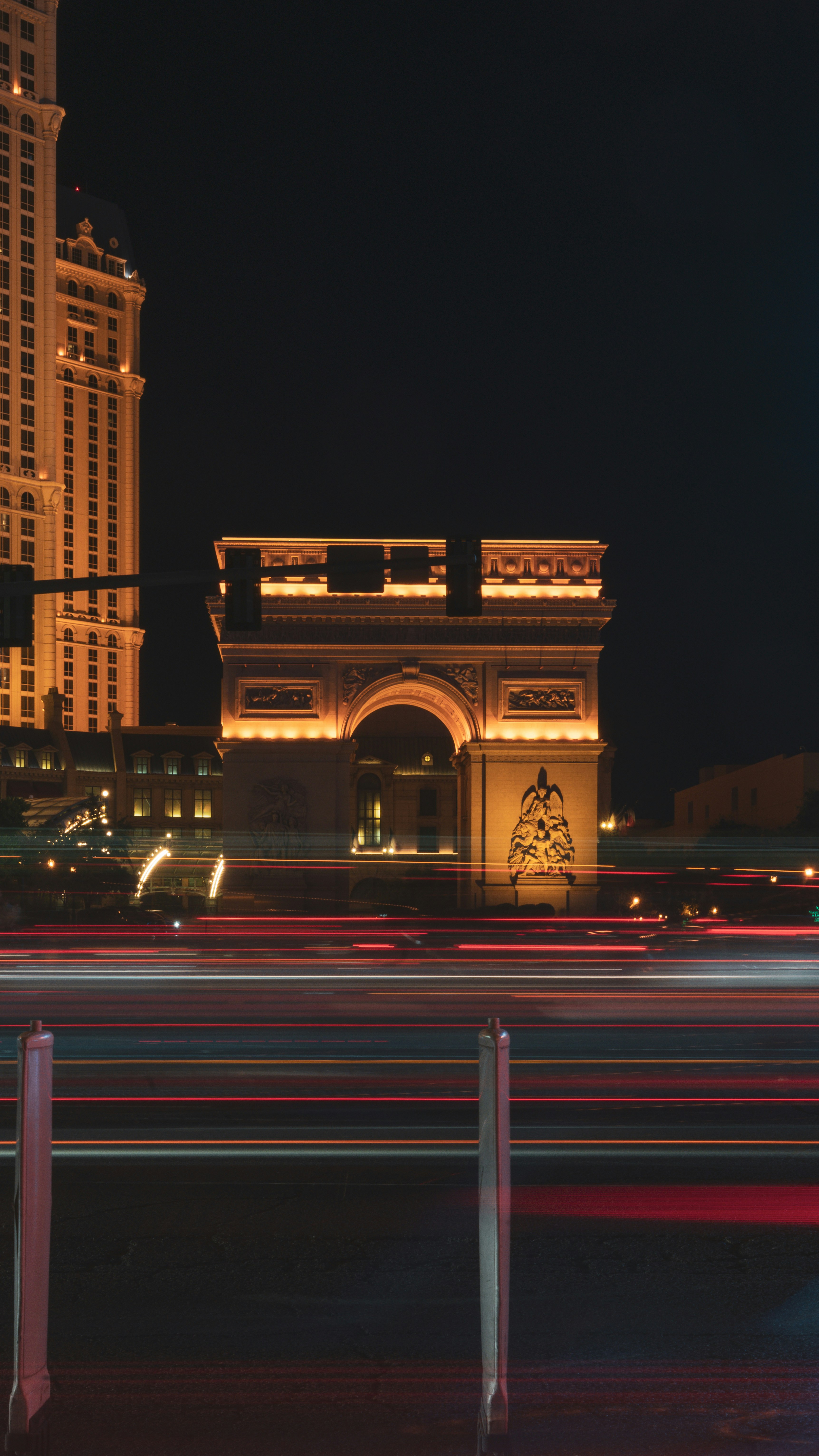 Arc of Night: Arc de Triomphe-like Monument Beneath A Veil of Light Trails