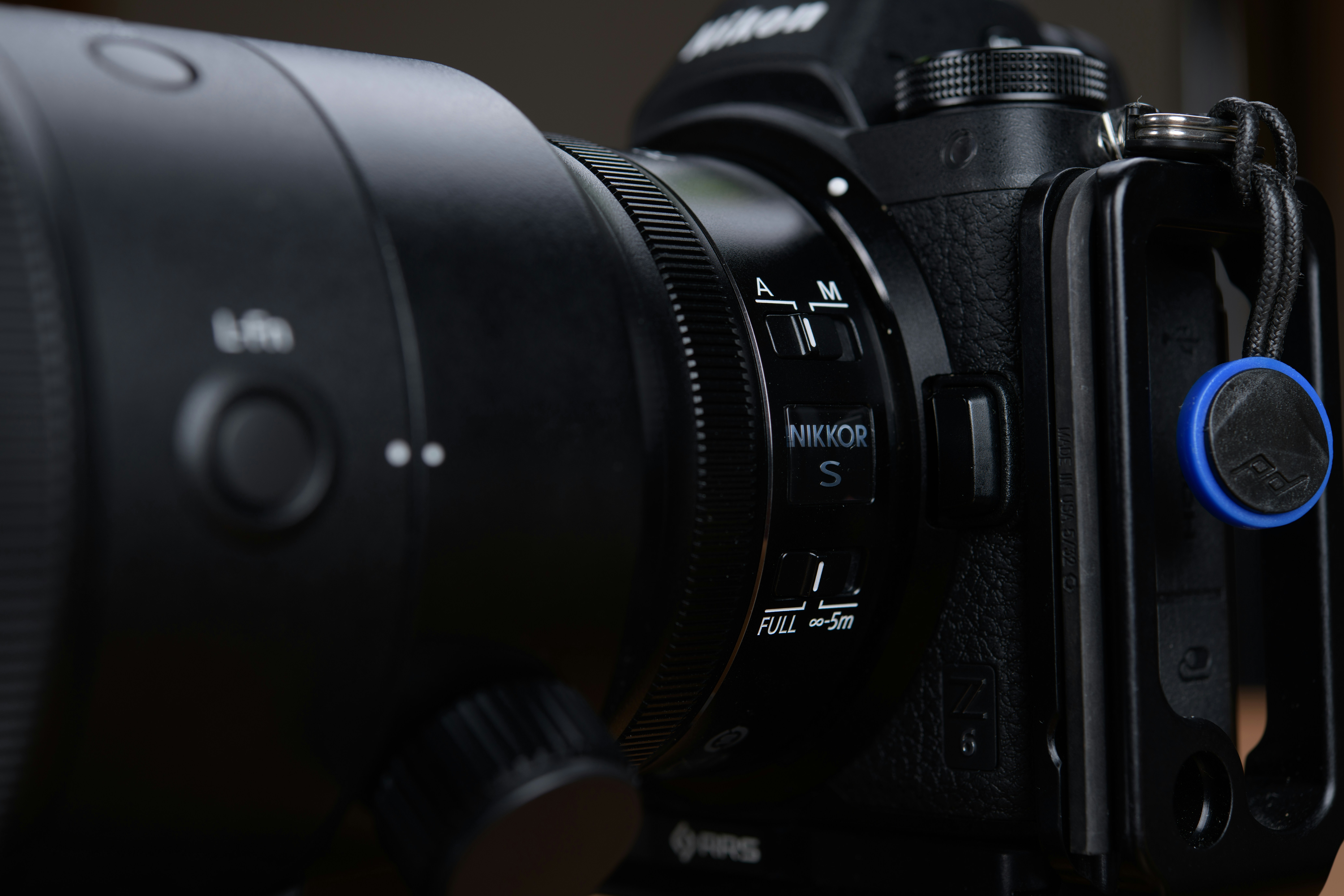 Black nikon dslr camera on brown wooden table photo – Free Black Image ...