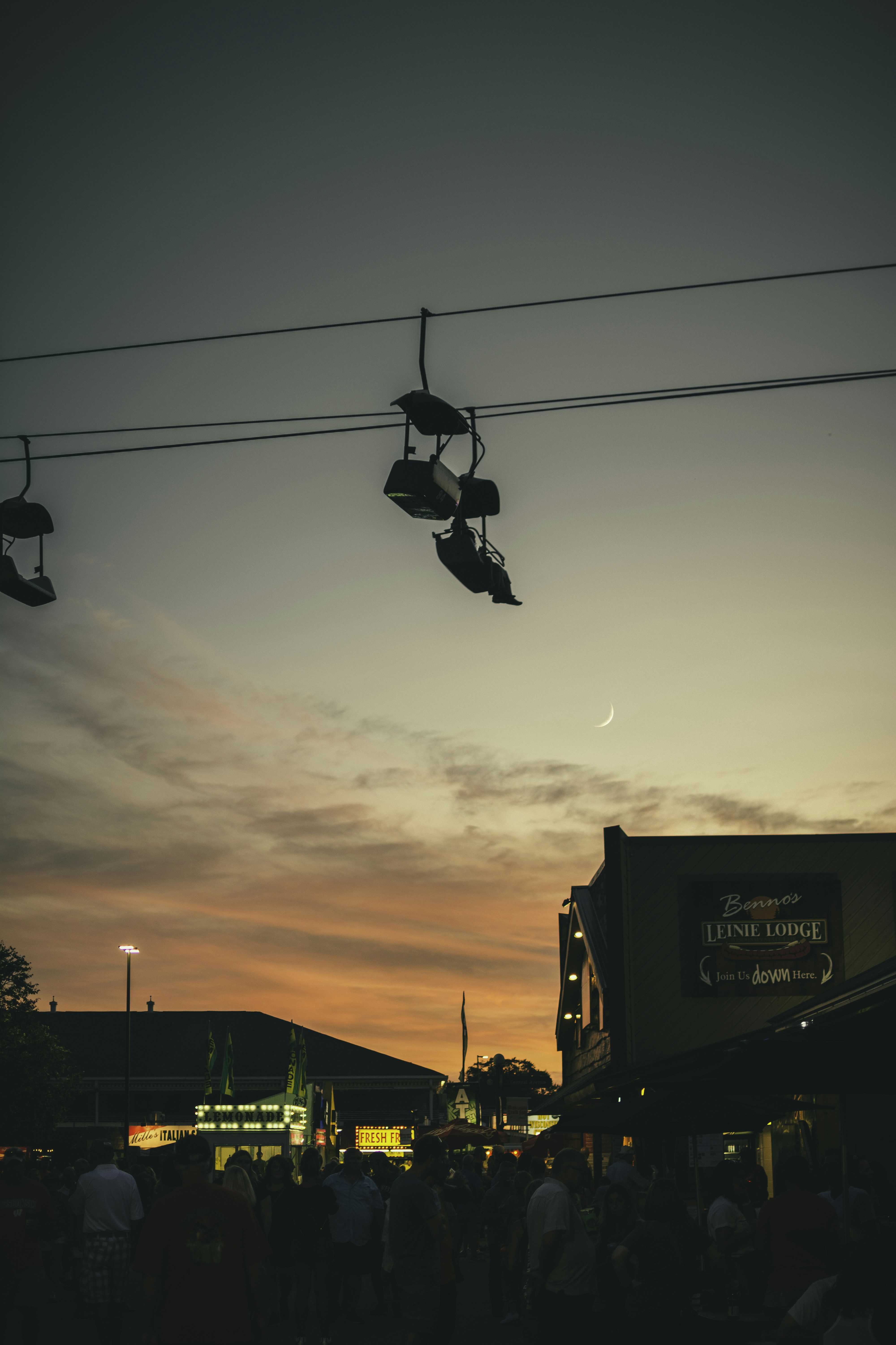Sunset Lift: Silhouettes Beneath a Quiet Gondola