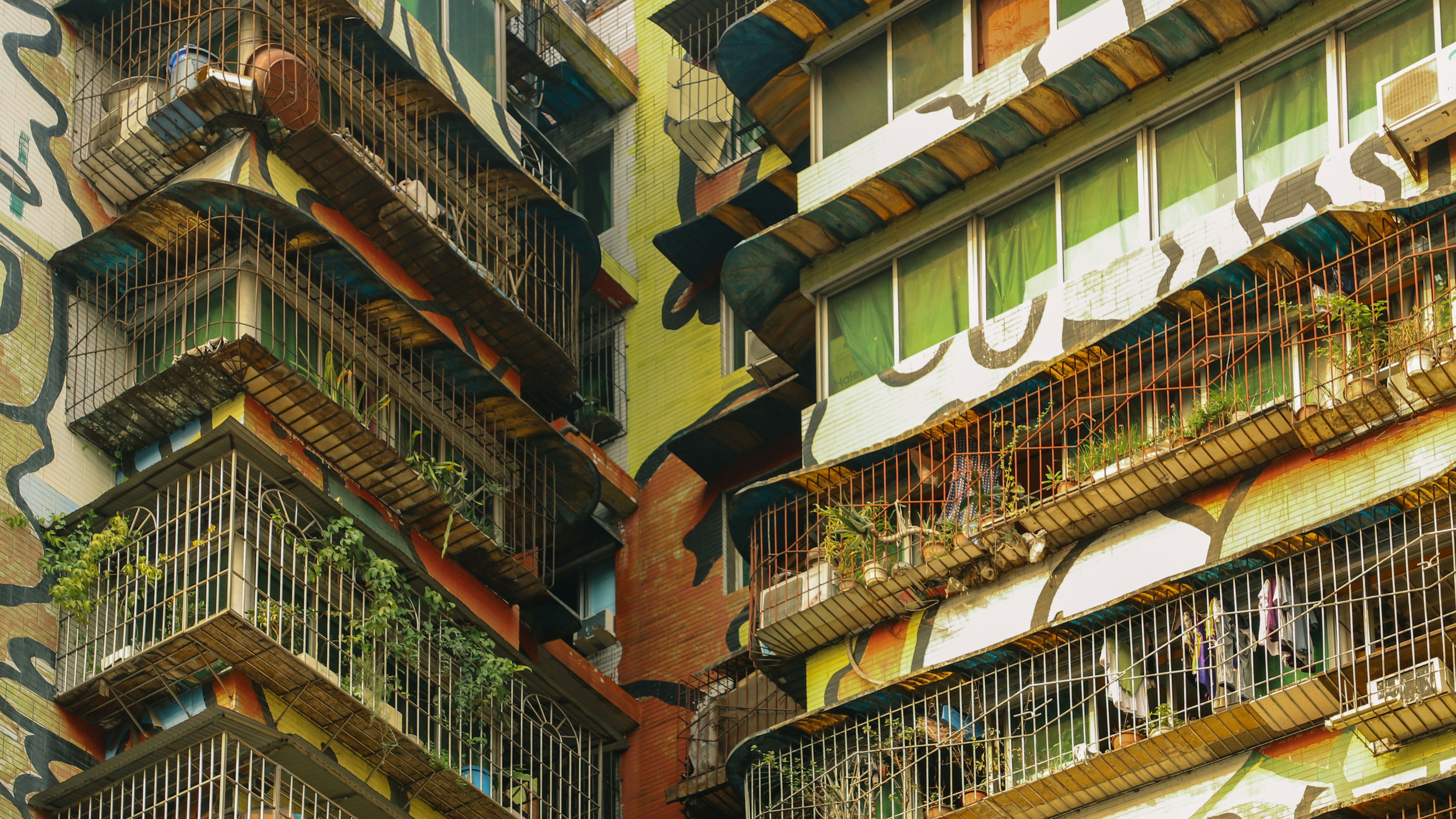 Balconies in Bloom: A Multistory Urban Garden Mosaic