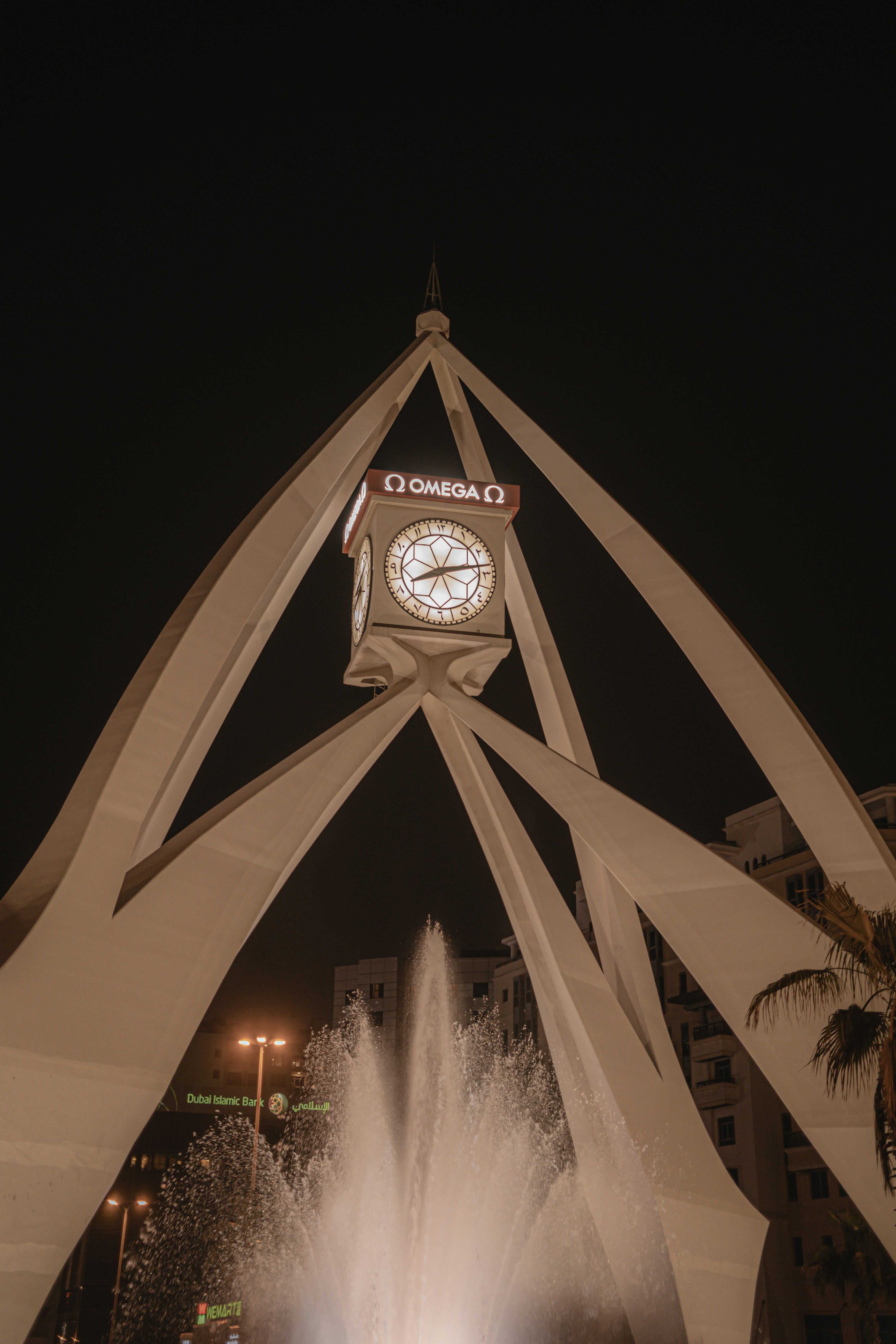 white and black tower with clock