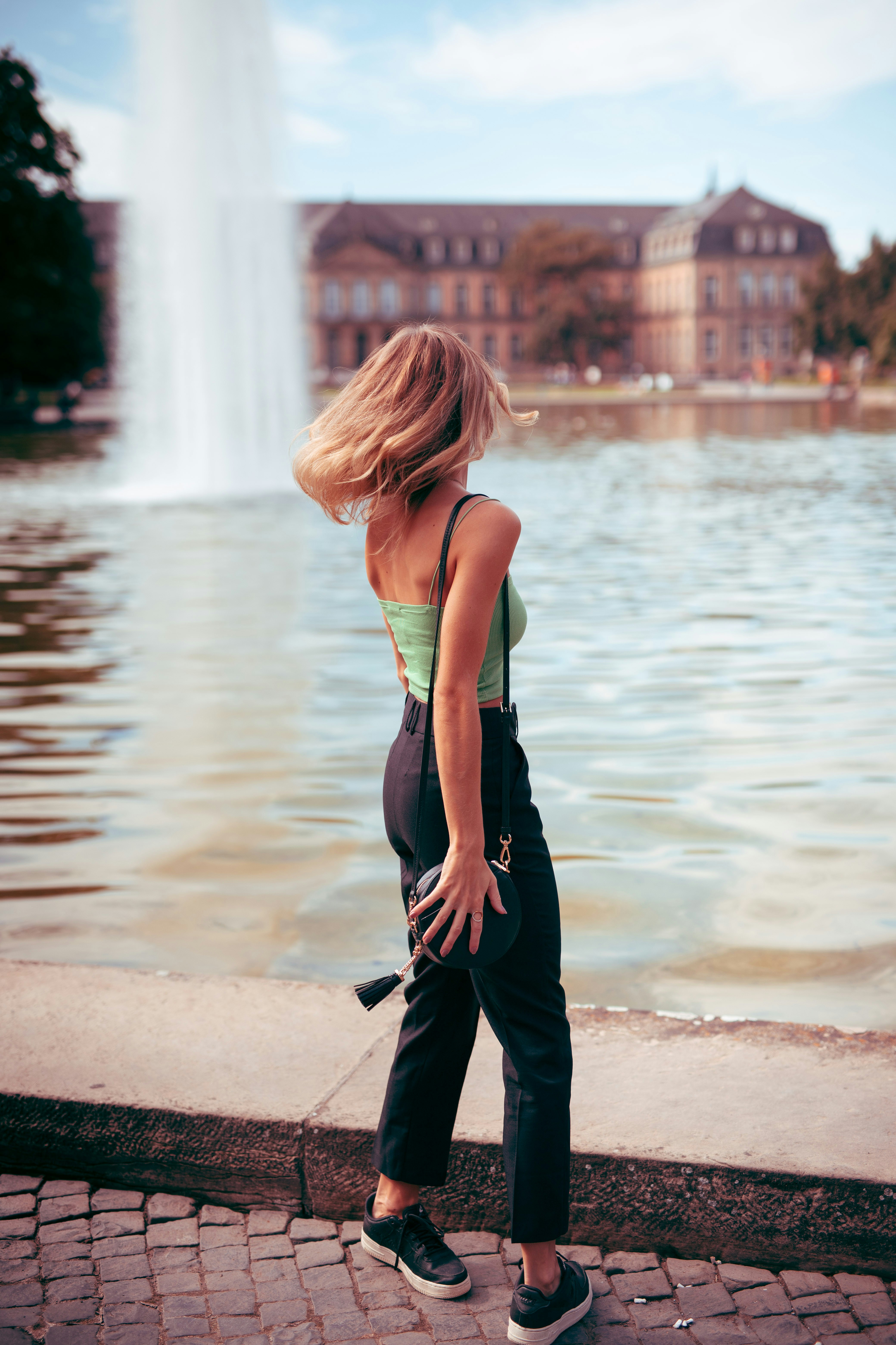 Wind-Tossed Portrait by the City Fountain