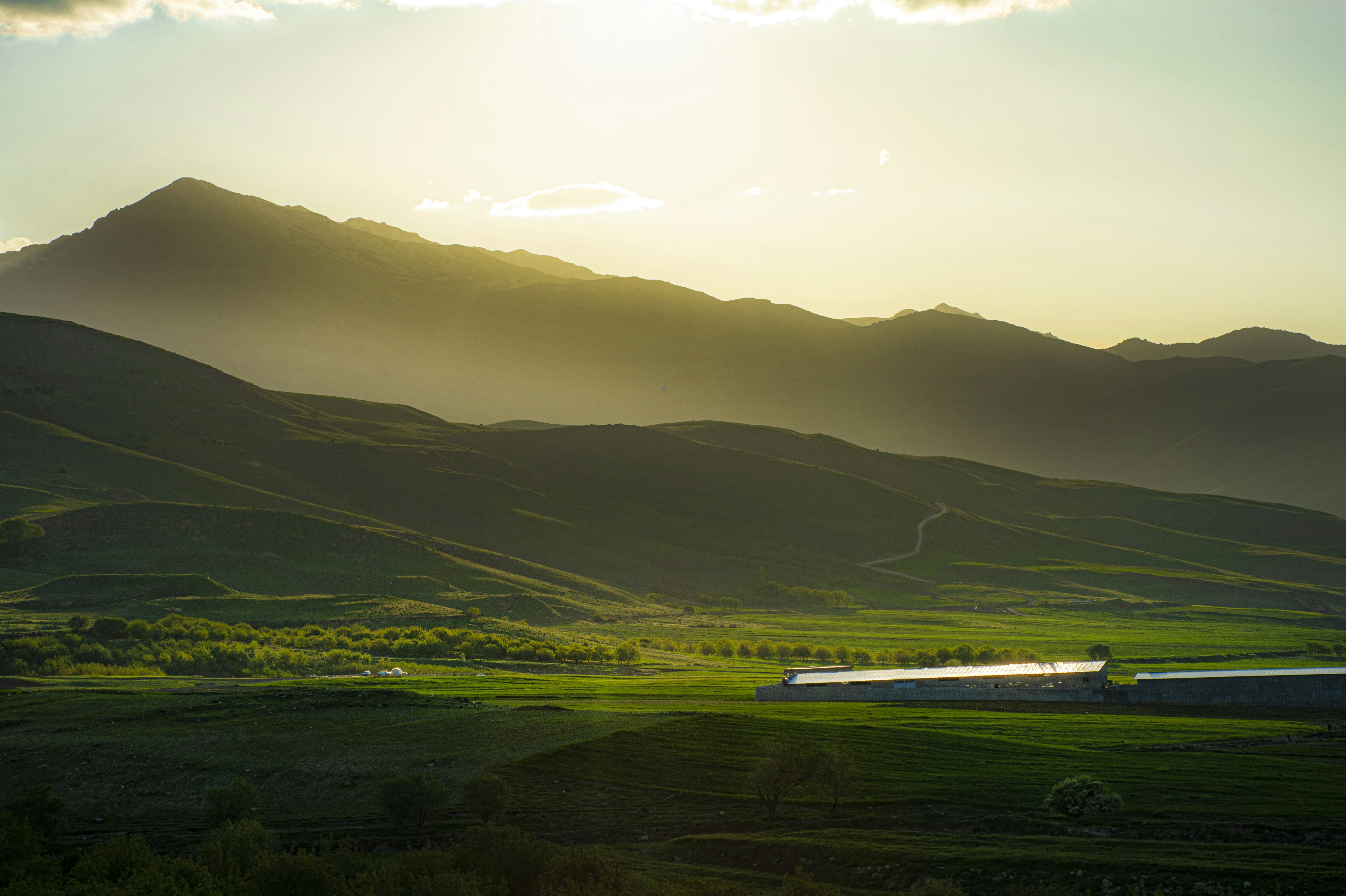 Green grass field near mountain during daytime photo – Free Green Image ...