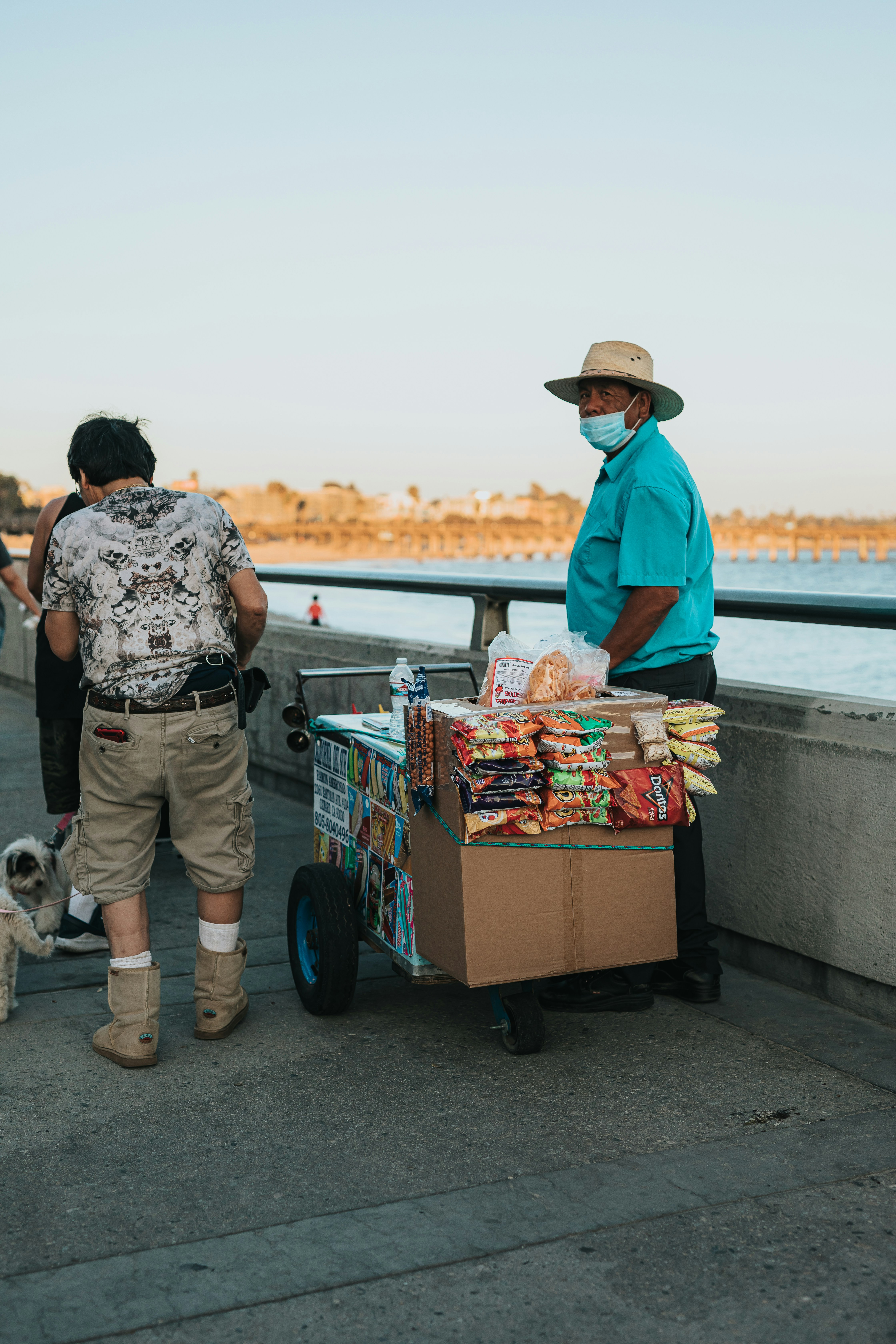 Turquoise Shirt Vendor at the Waterfront Snack Cart